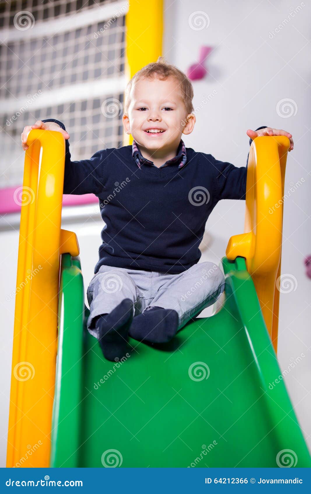 Boy Playing on the Slide at the Playground Stock Photo - Image of ...