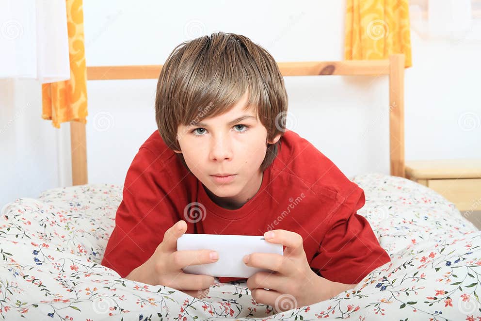 Boy Playing with Smartphone Stock Photo - Image of computer, handphone ...