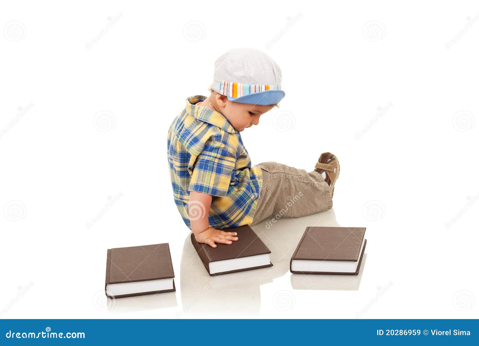 Boy Playing with Some Books Stock Image - Image of read, studying: 20286959