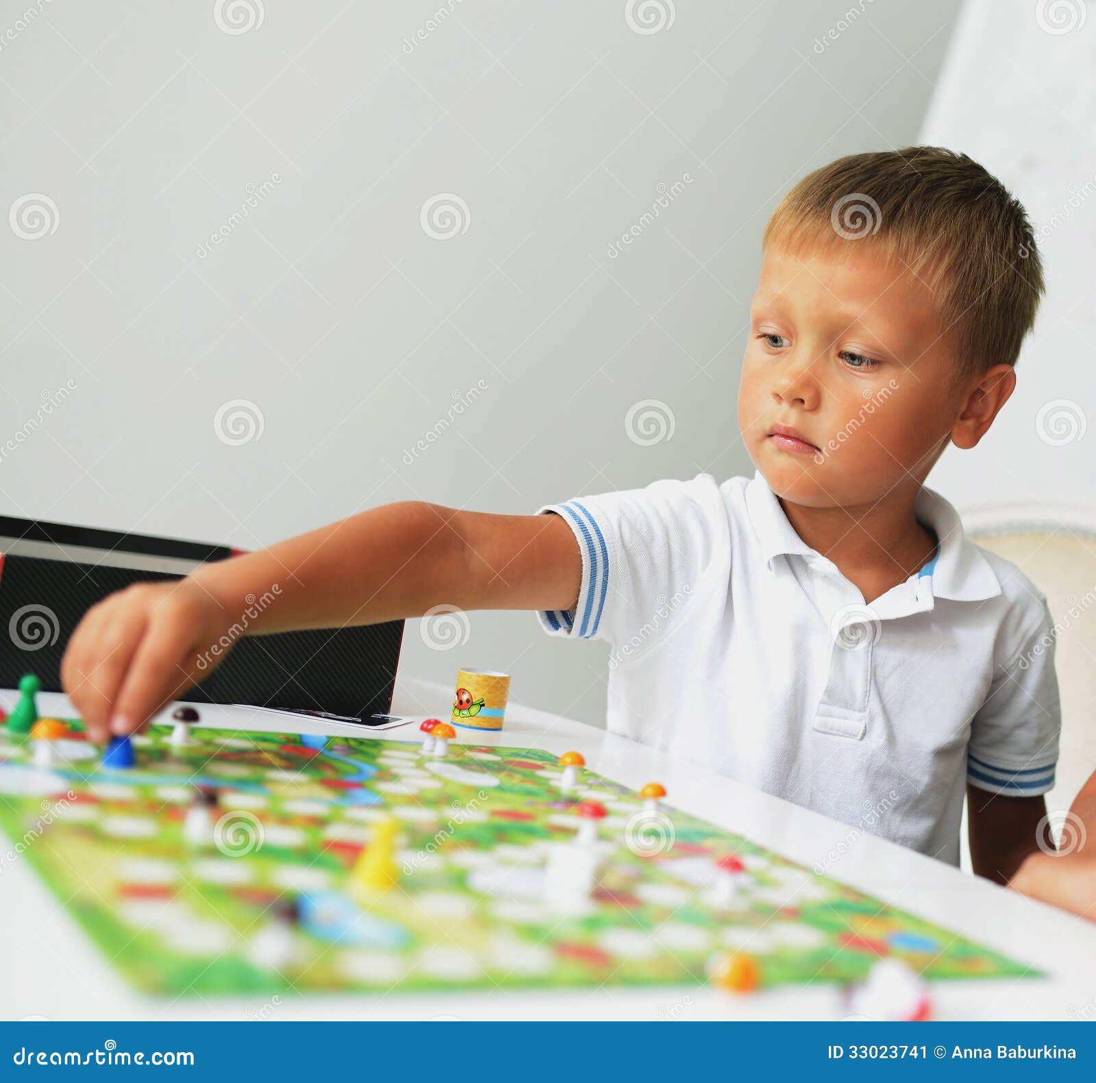 A Boy Playing with Table Game Stock Image - Image of child, blocks ...