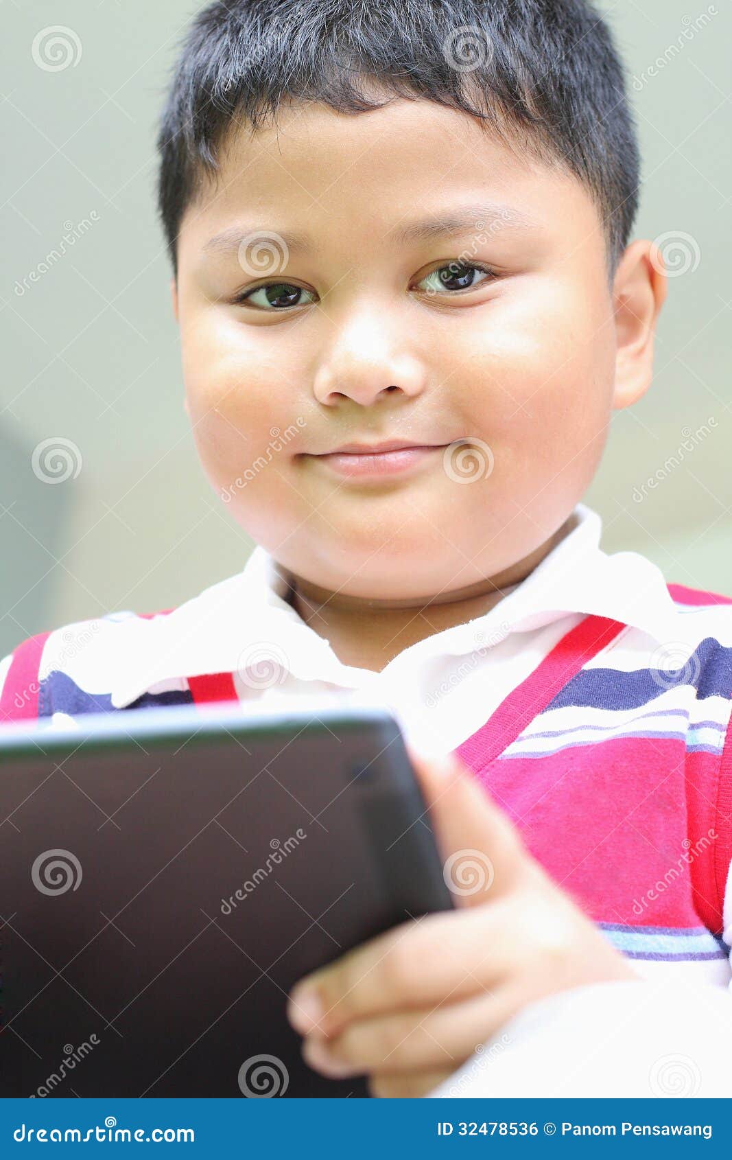 Boy playing Tablet fun. stock photo. Image of cute, home - 32478536