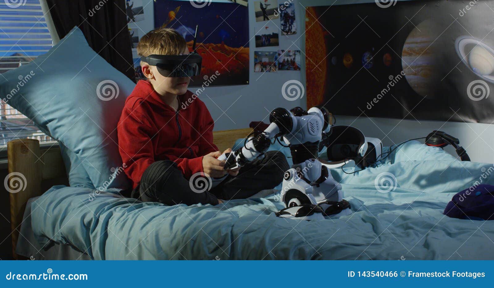 Boy Playing with a Toy Robot Stock Photo - Image of imitation, indoors ...