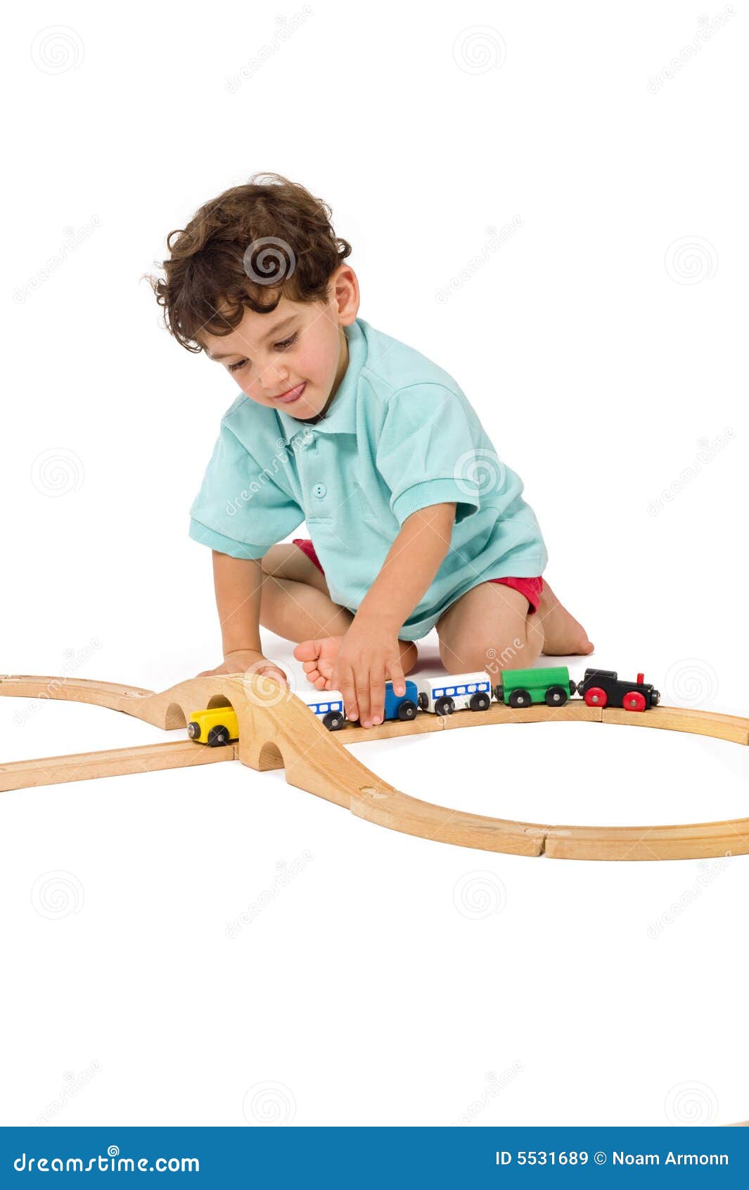 Boy playing with train stock image. Image of people, happy - 5531689