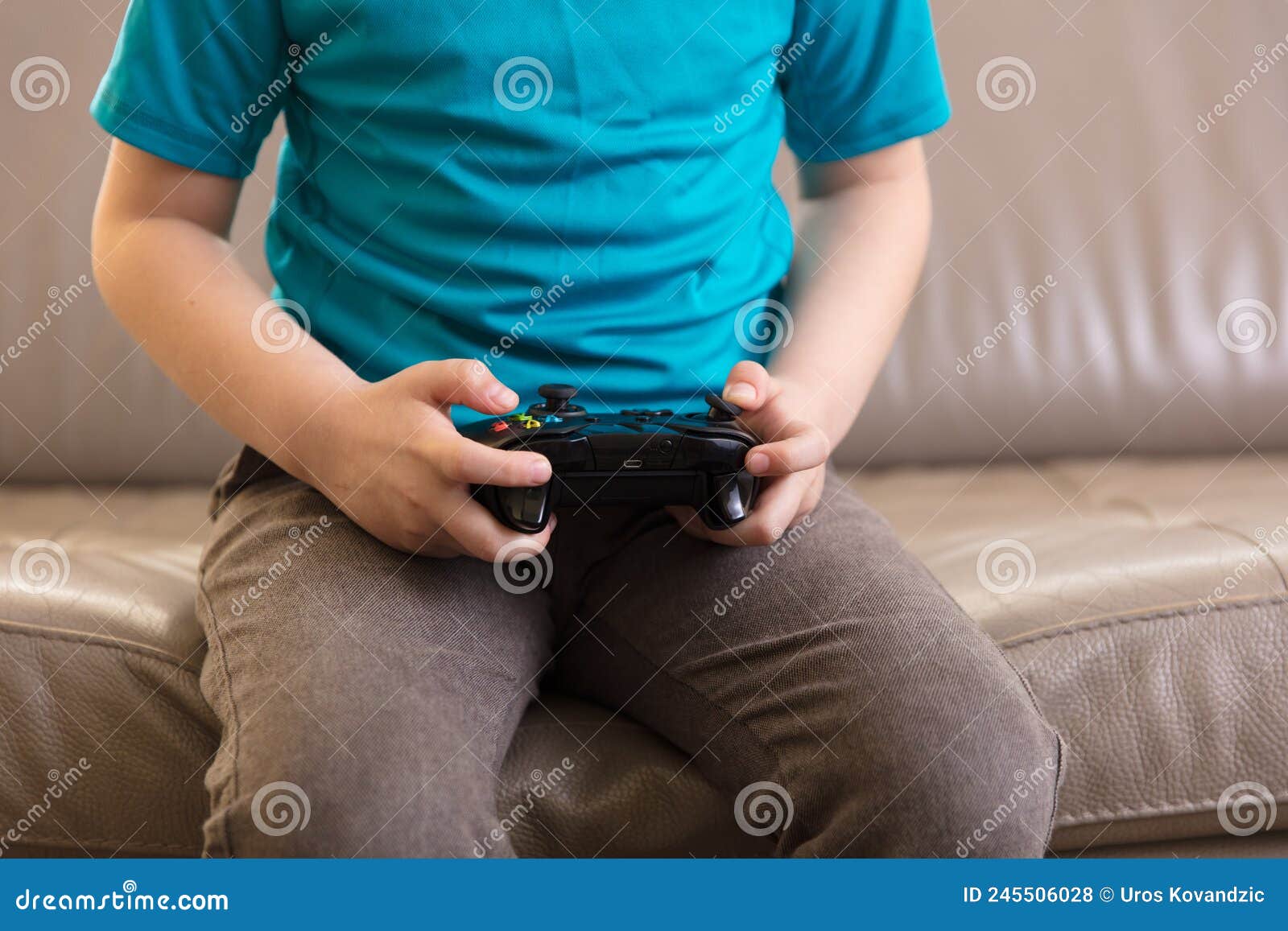 Boy playing video games stock photo. Image of competitive - 245506028