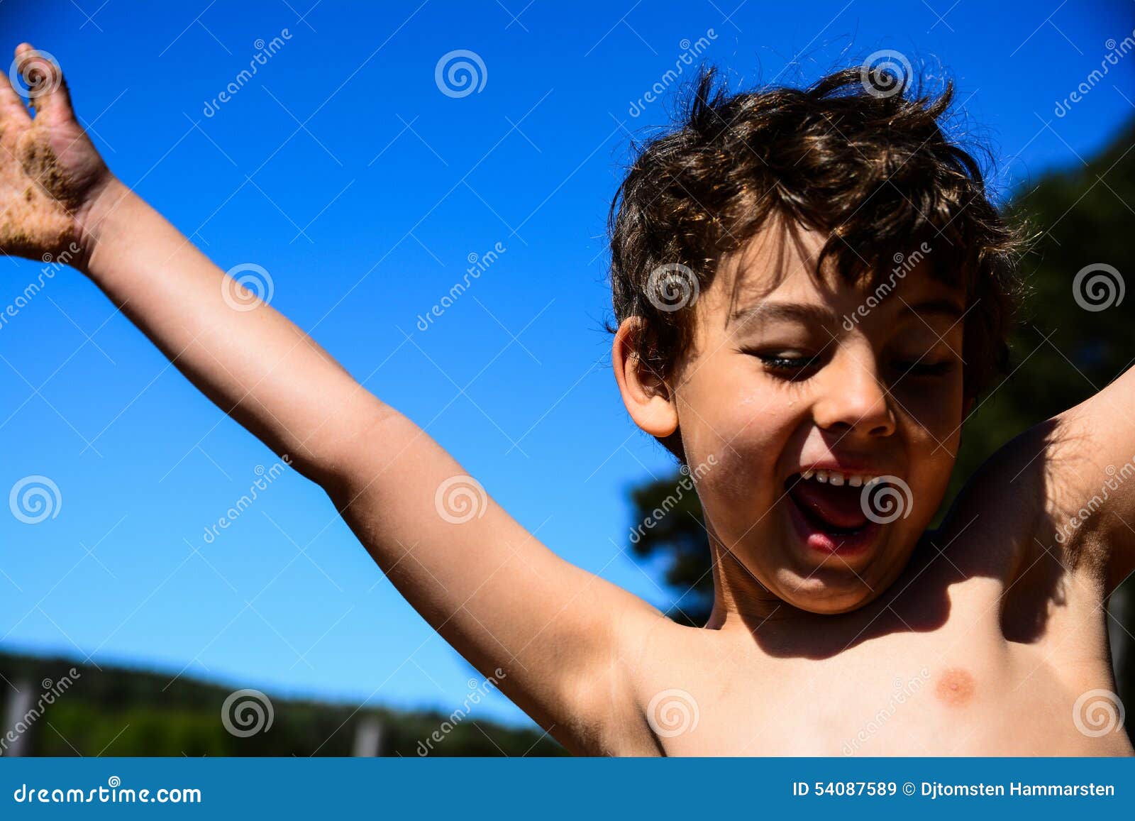 Boy playing in the water stock image. Image of healthy - 54087589