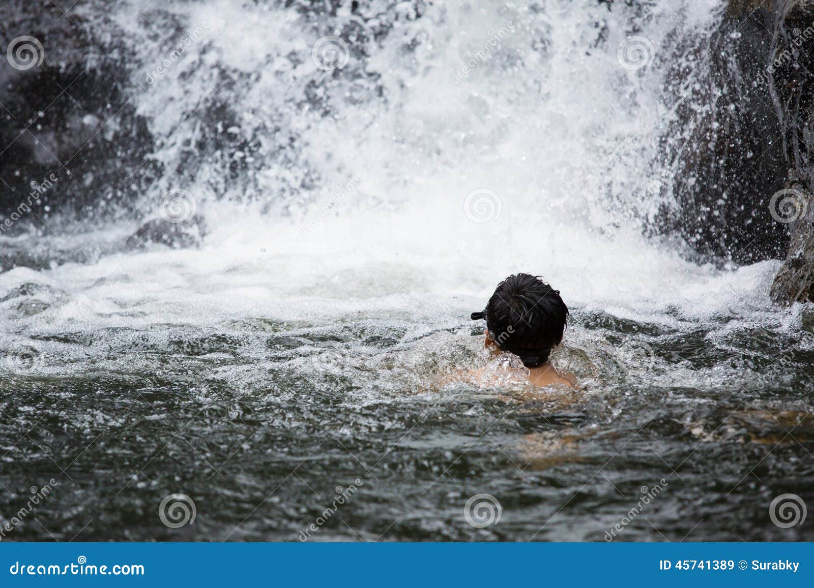 Boy Playing in Water of Waterfall Stock Image - Image of person, nature ...