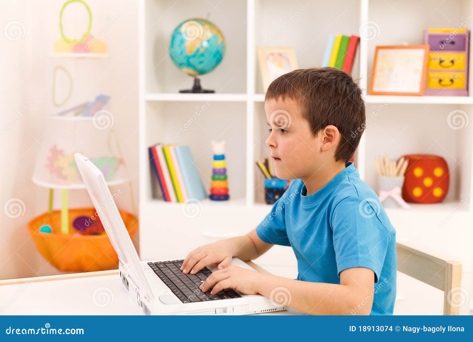 Boy Playing or Working on Laptop Computer Stock Photo - Image of ...