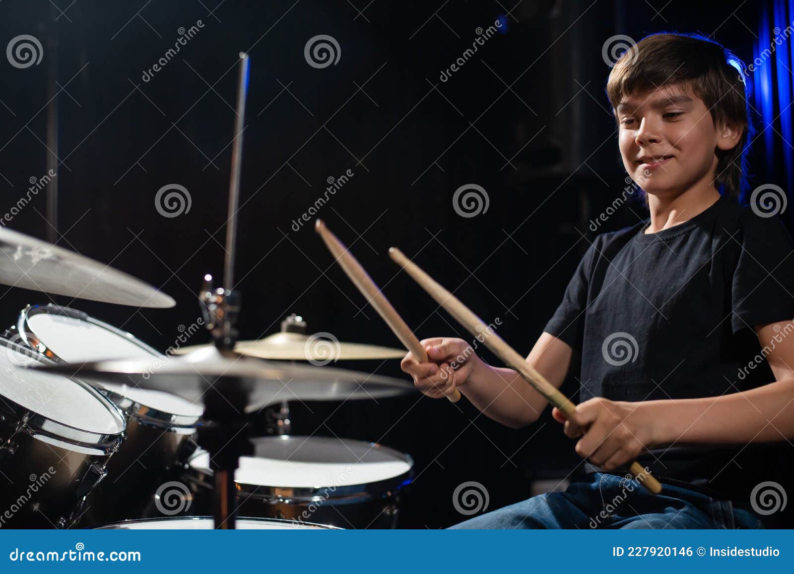A Boy Plays Drums in a Recording Studio Stock Photo - Image of note ...