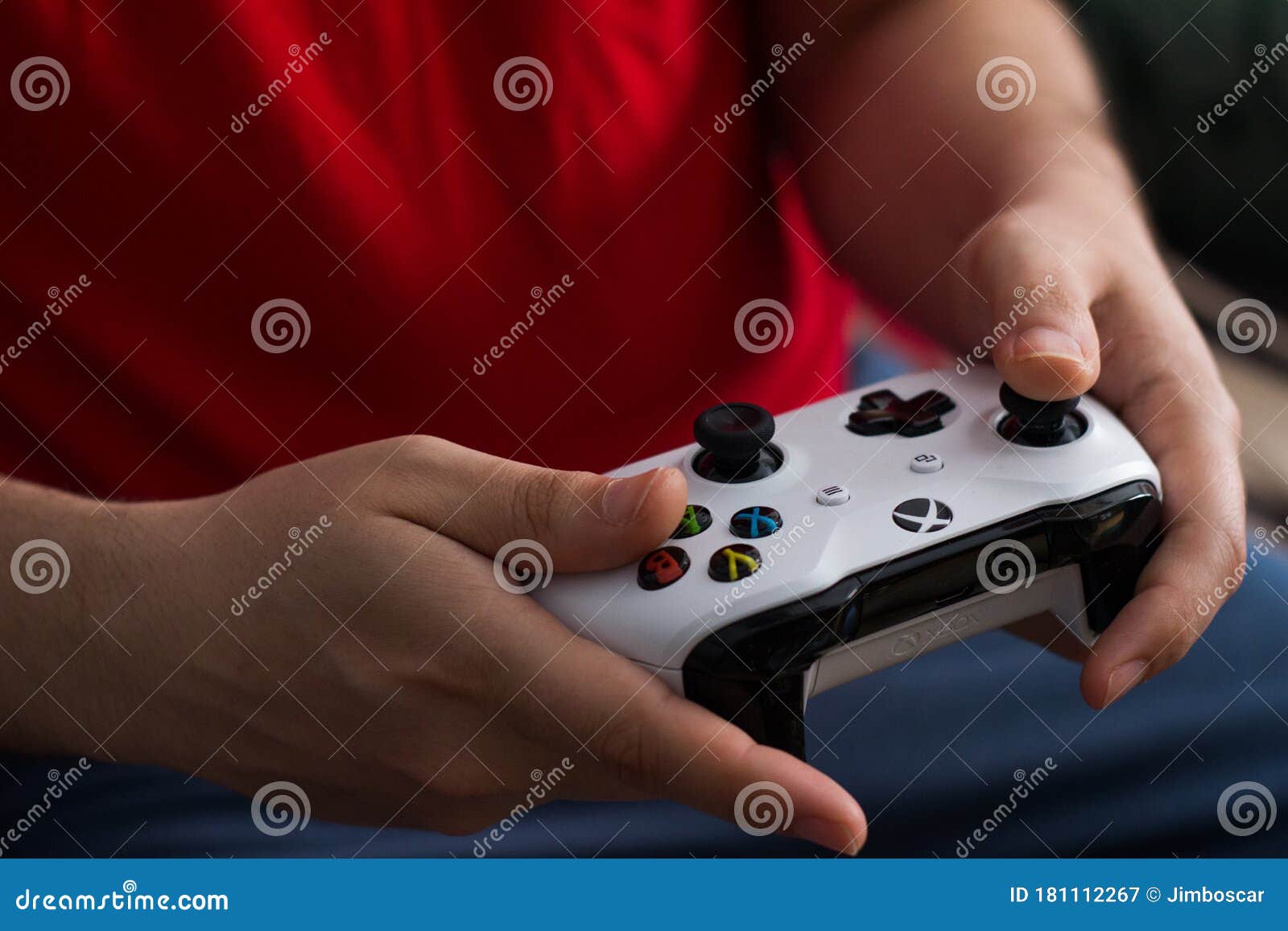 Boy Plays with the Joystick of an Xbox Game Console Editorial ...