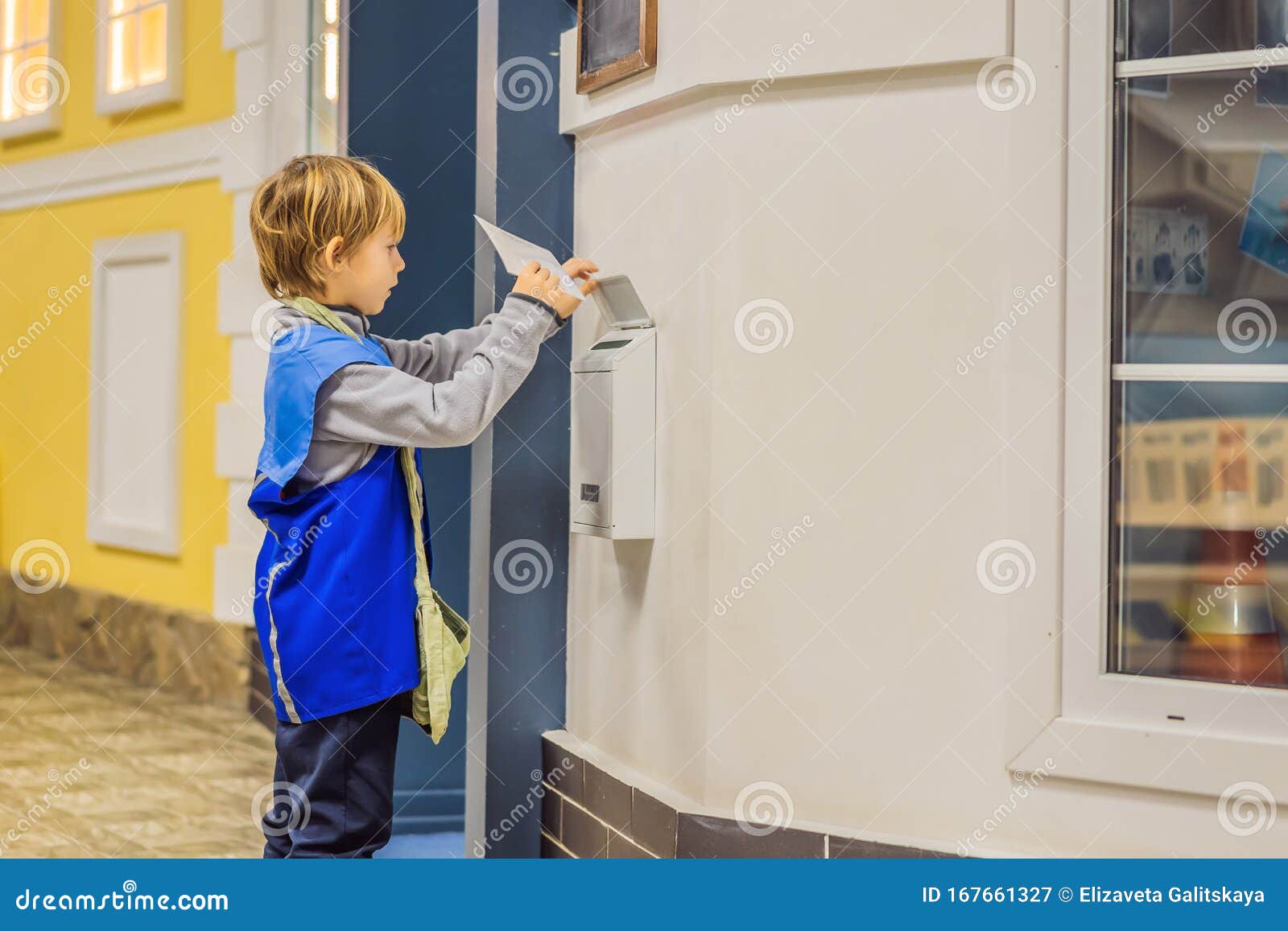 The Boy Plays that he is a Postman Stock Image - Image of mailing ...