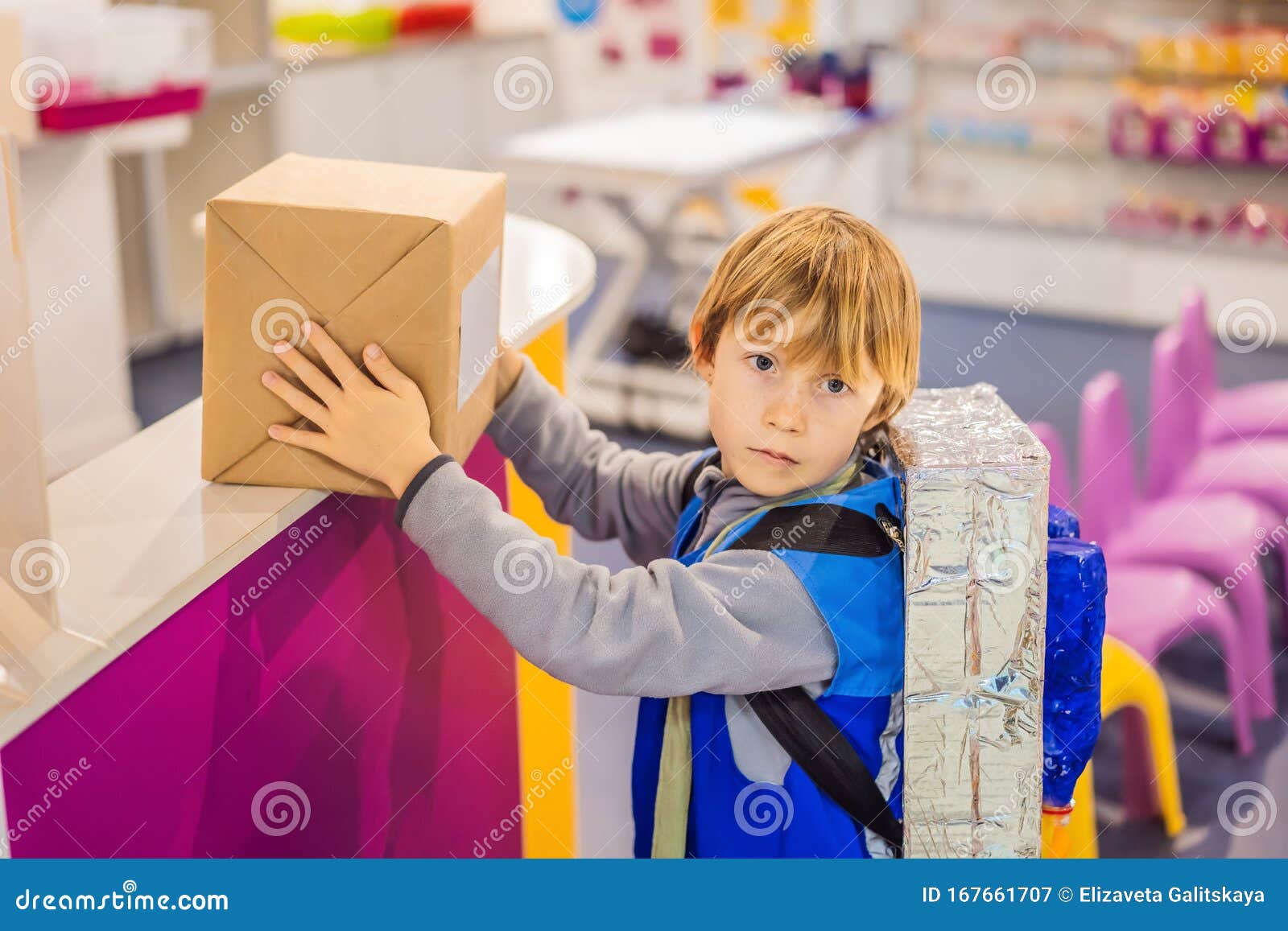 The Boy Plays that he is a Postman Stock Image - Image of envelope ...