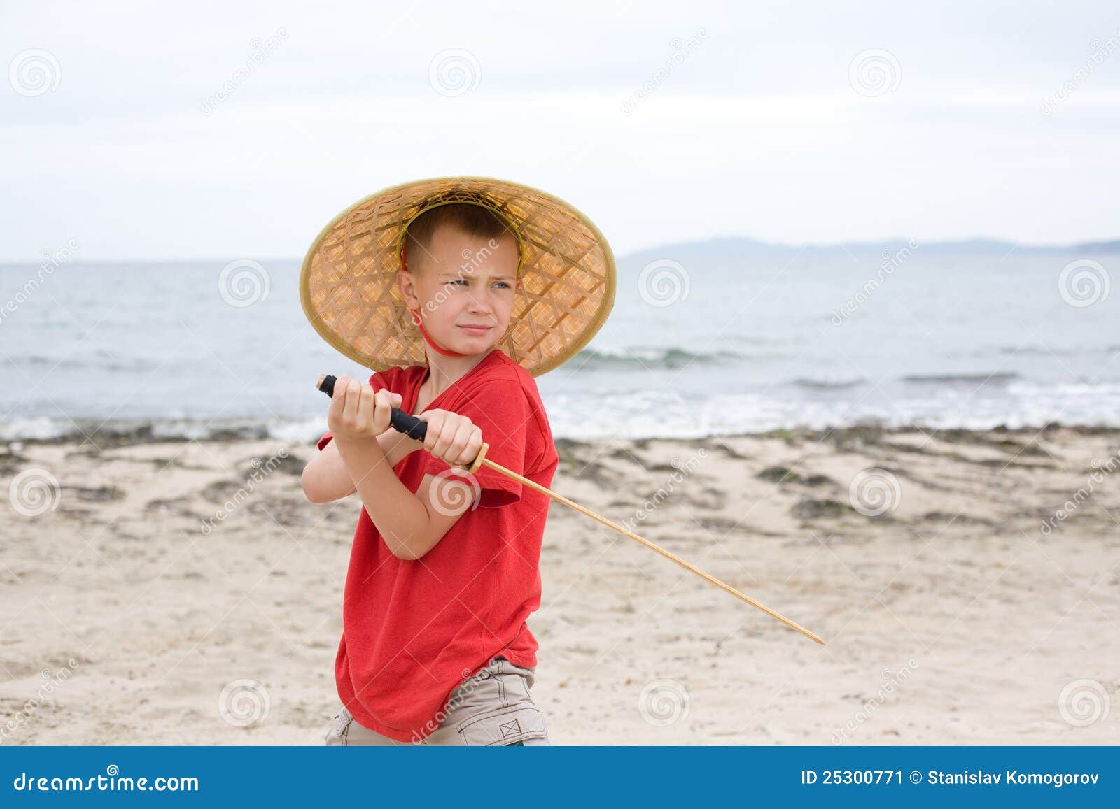 Boy Plays with a Samurai Sword Stock Image - Image of game, beach: 25300771
