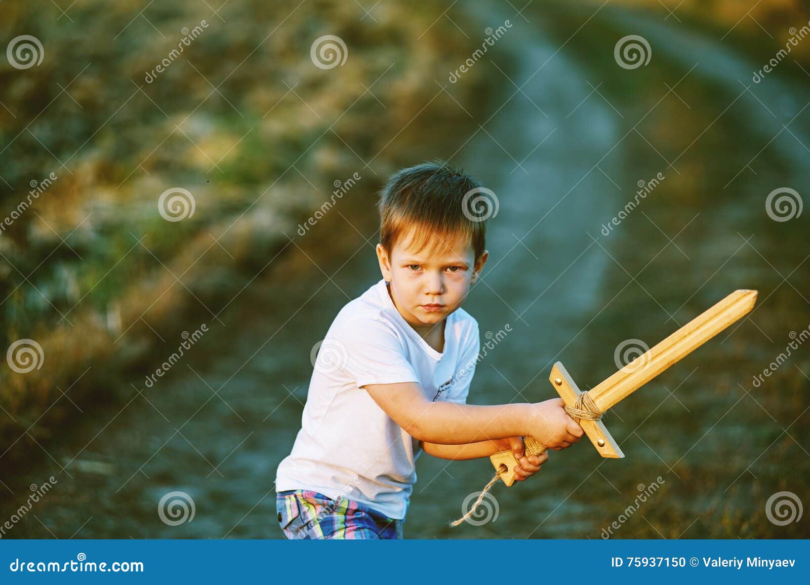 A Boy Plays with a Wooden Sword Stock Photo - Image of freedom ...