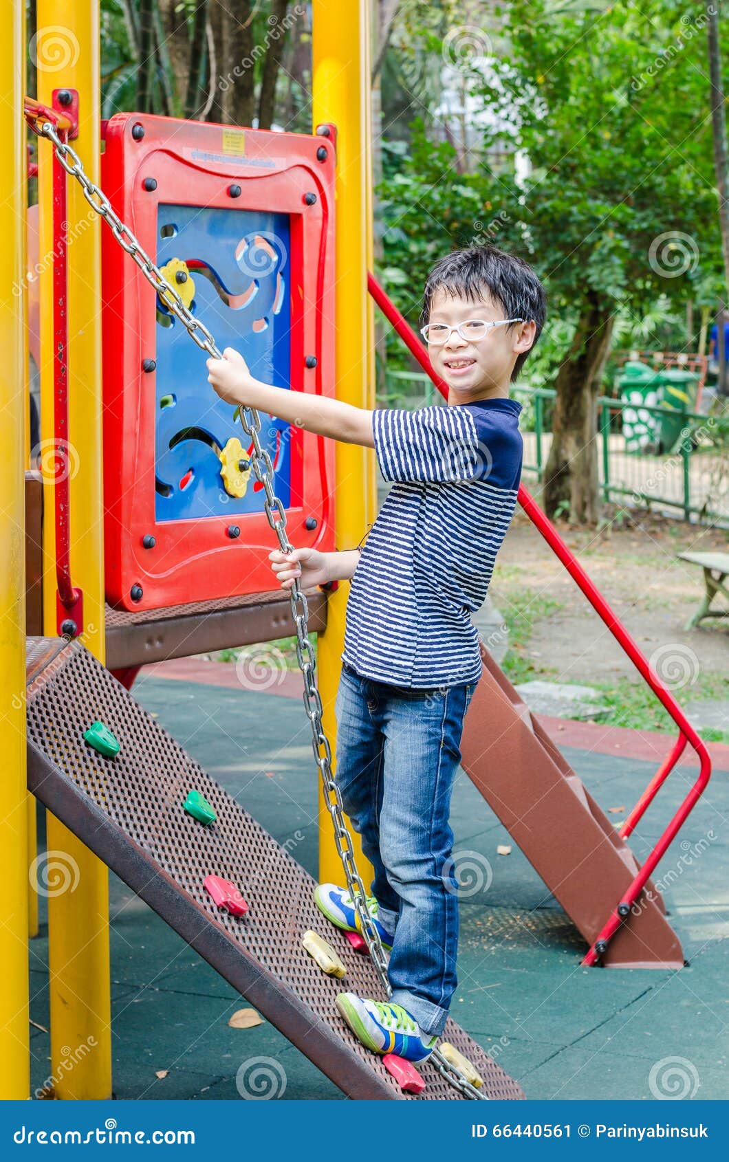 Boy plying in playground stock image. Image of climb - 66440561