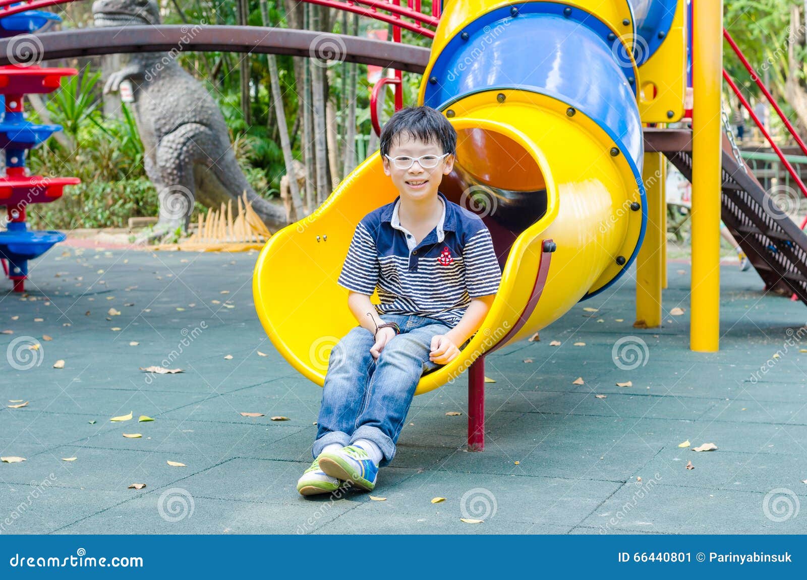 Boy plying in playground stock image. Image of childcare - 66440801