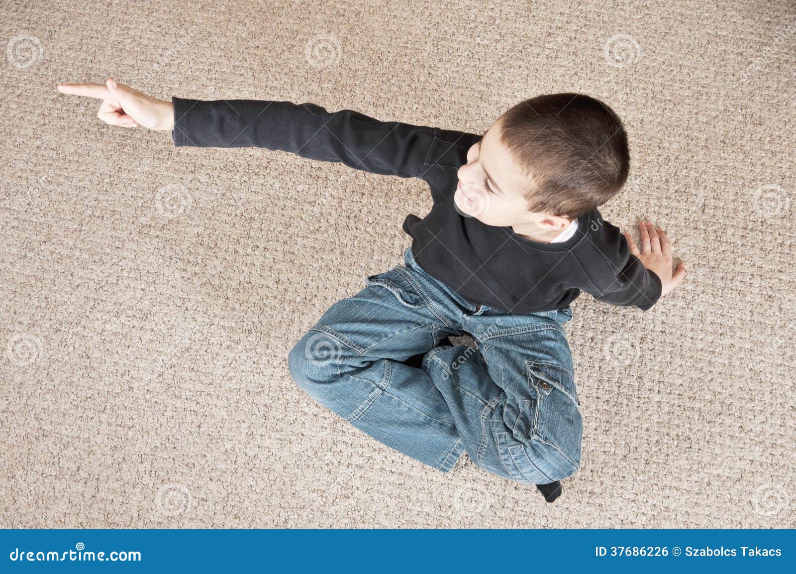 Boy pointing top view stock photo. Image of raised, view - 37686226