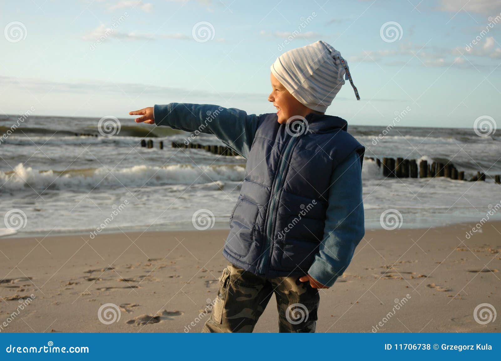 The Boy is Pointing on the Water Stock Photo - Image of ocean, pointing ...