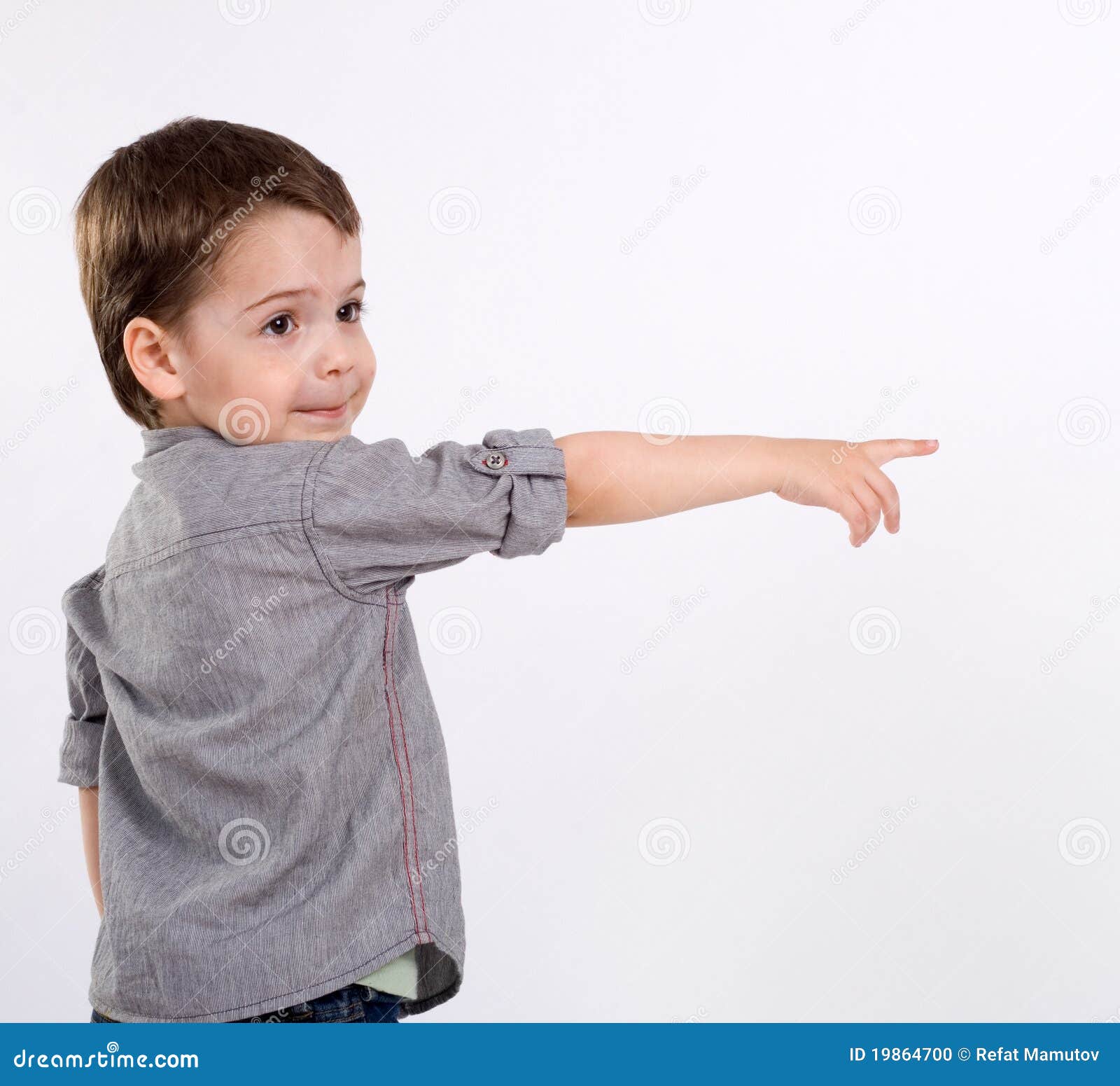 Boy points at something stock photo. Image of male, studio - 19864700