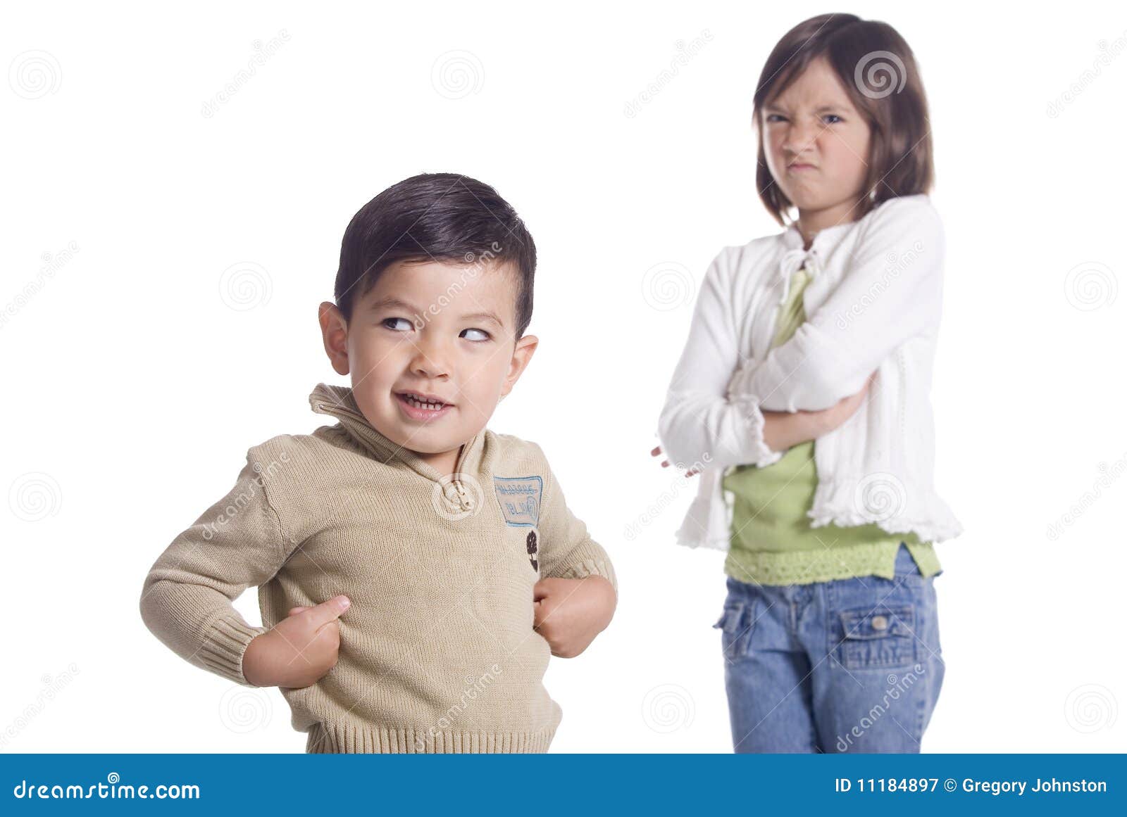 Boy pokes fun at sister. stock image. Image of sibling - 11184897