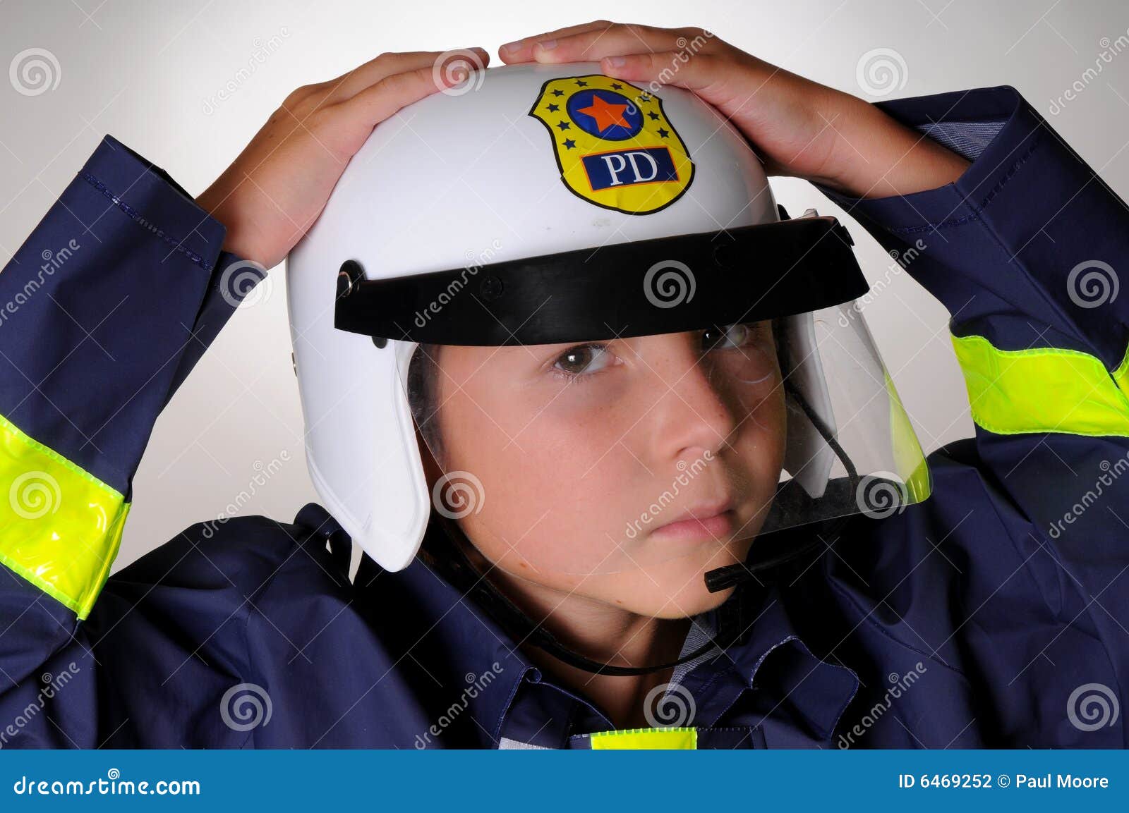 Boy in policeman Costume stock photo. Image of american - 6469252