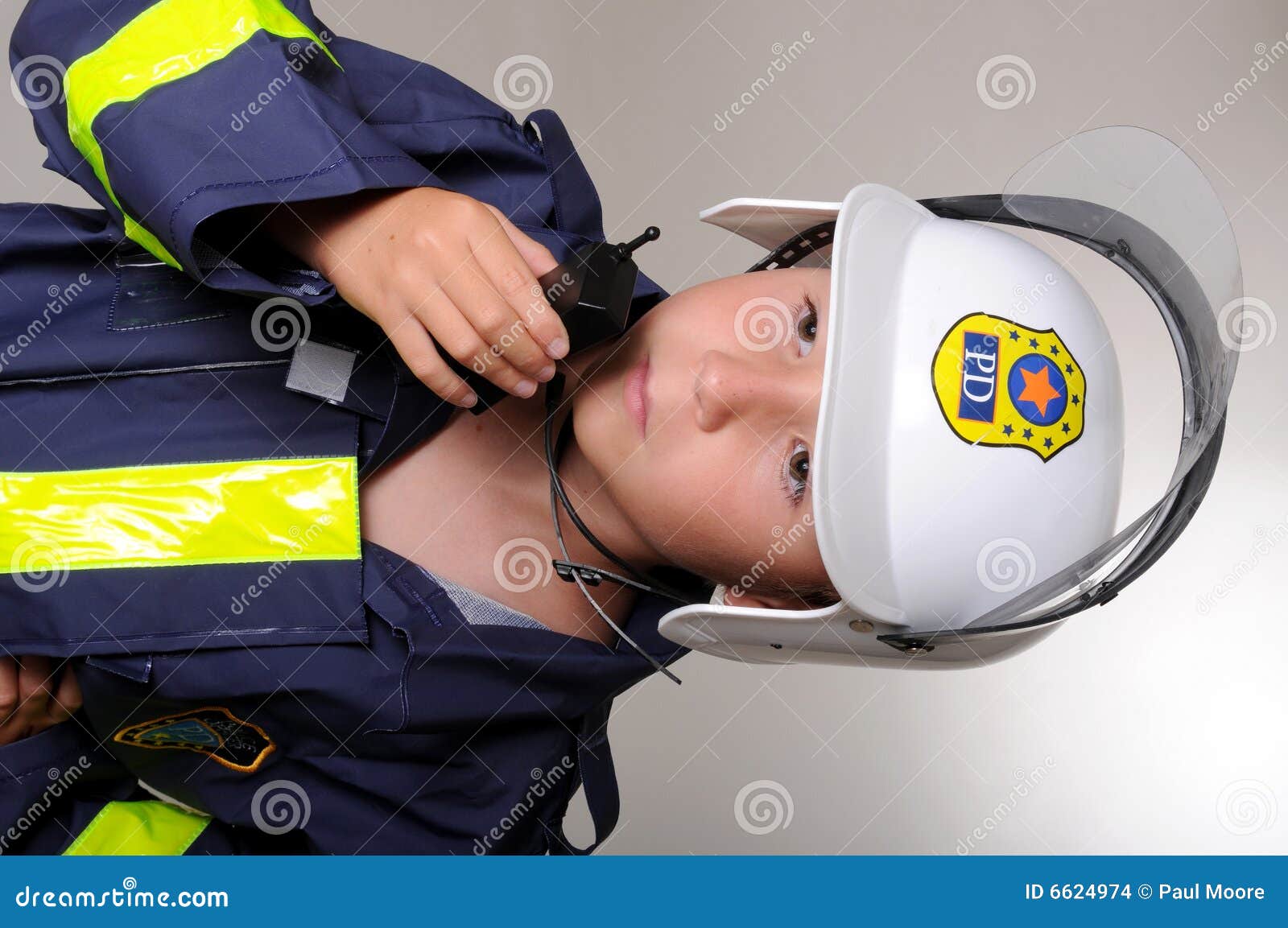 Boy in policeman Costume stock photo. Image of pretend - 6624974