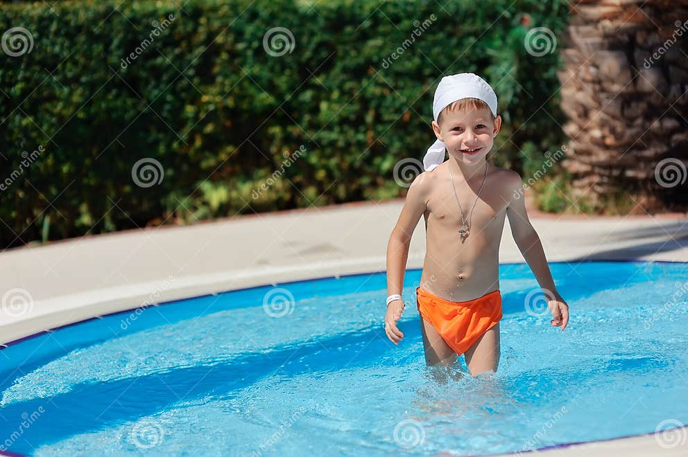 Boy in pool stock photo. Image of little, playing, relaxation - 26543470