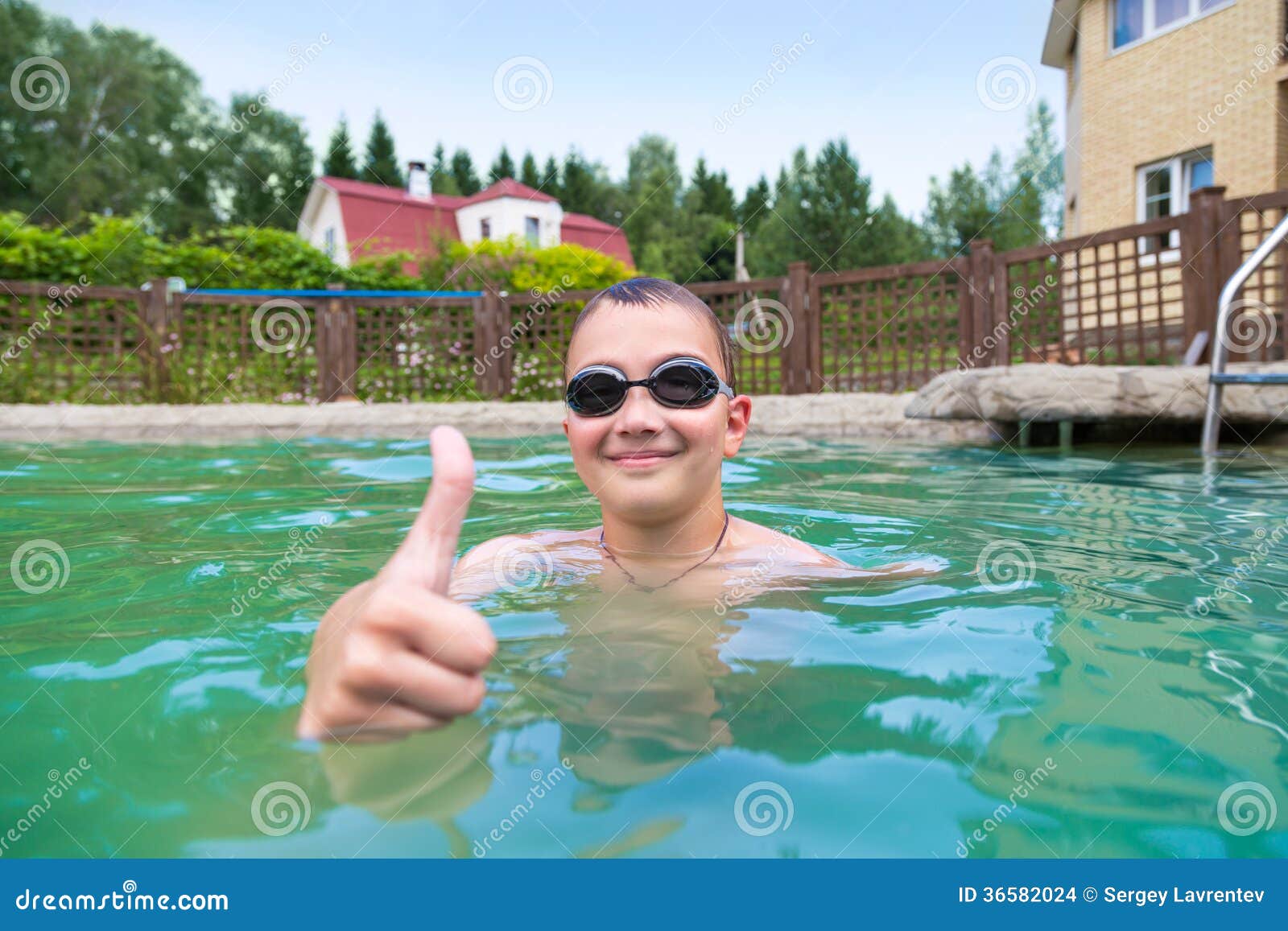 Boy in the pool outdoors stock photo. Image of pond, thumbs - 36582024