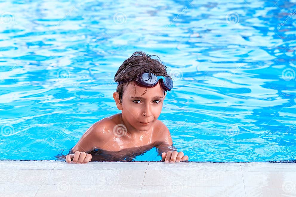 Boy in the pool stock image. Image of blue, aqua, outdoors - 31364491