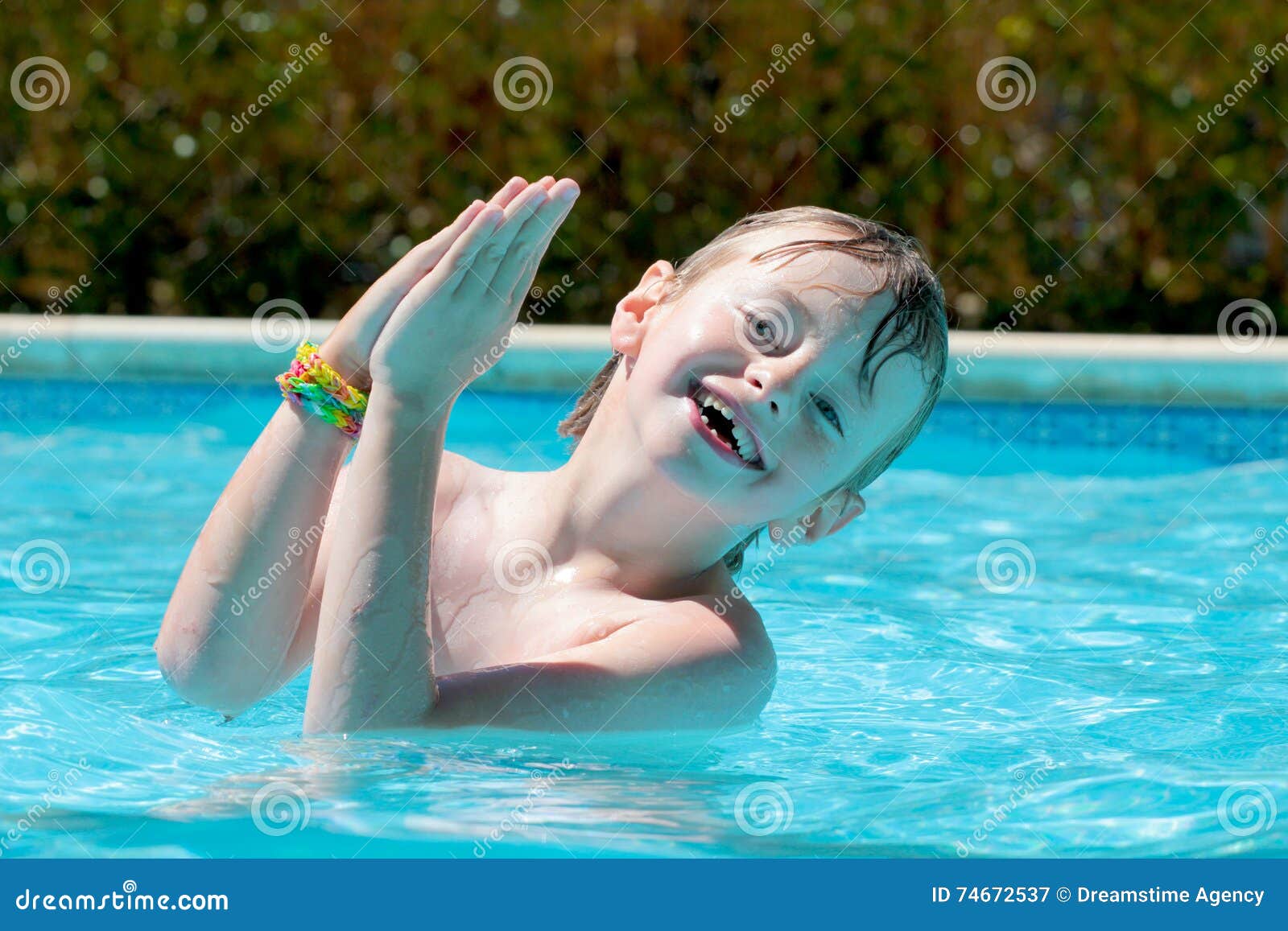 Boy in the pool stock image. Image of hands, smiling - 74672537