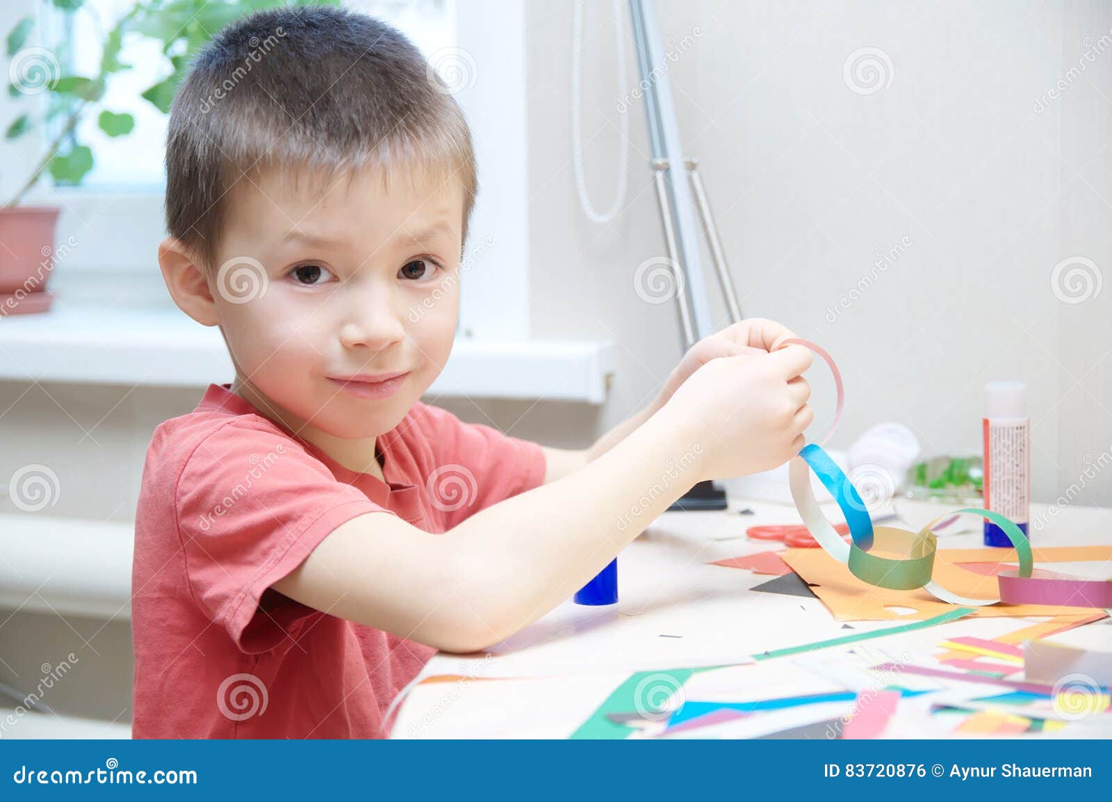 Boy Portrait Playing with Paper, Child Crafting Activity Stock Photo ...