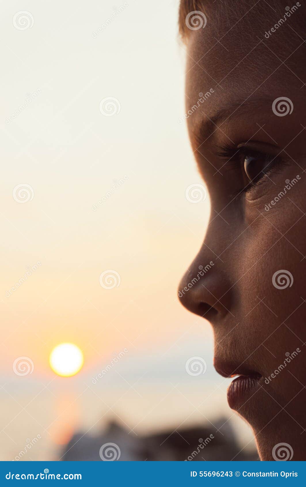 Boy portrait in sunlight stock image. Image of sunset - 55696243