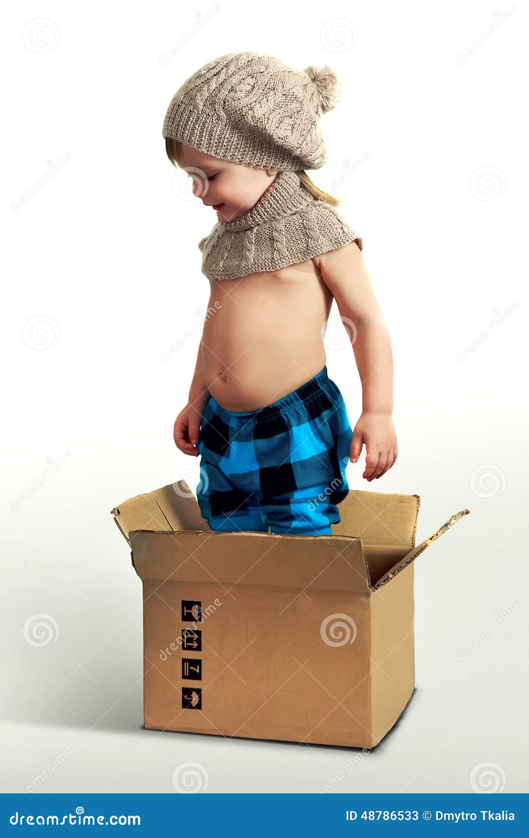 Boy posing in a box stock image. Image of cardboard, children - 48786533