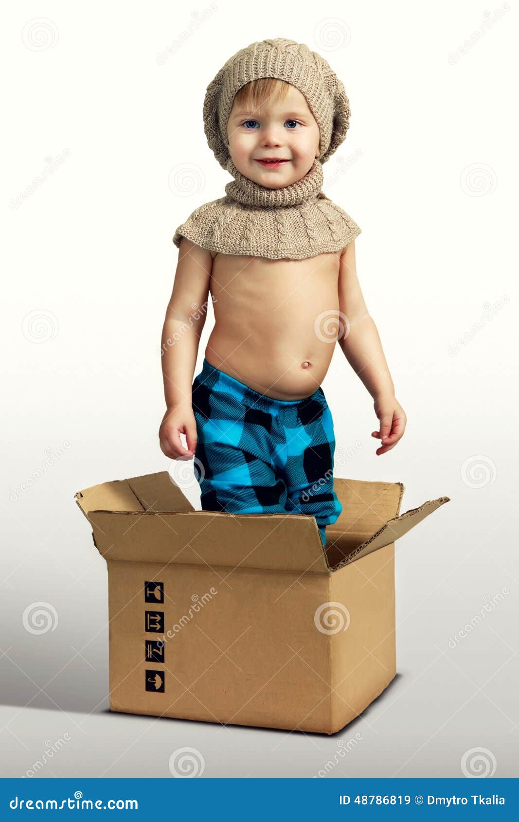 Boy posing in a box stock image. Image of childhood, children - 48786819