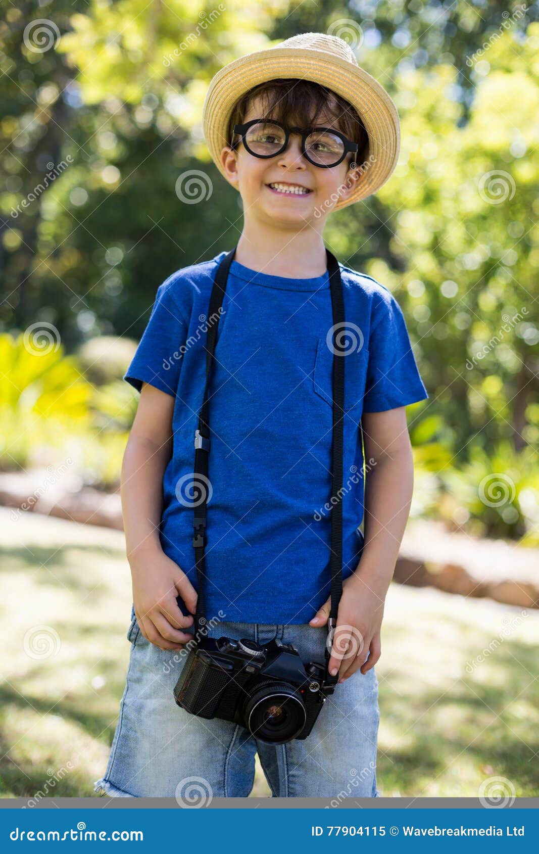 Boy Posing with a Camera Around His Neck Stock Image - Image of cute ...