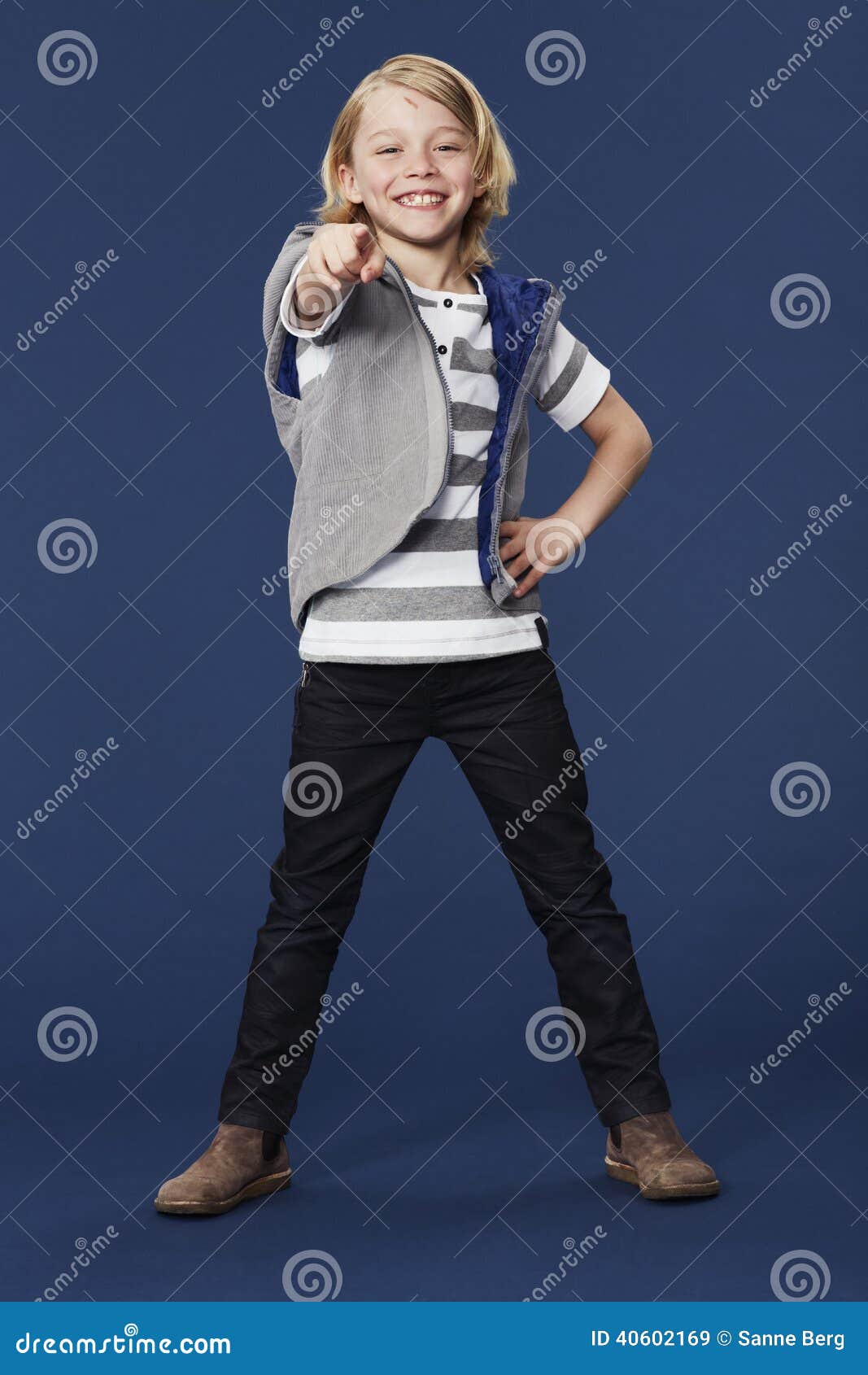 Boy posing in studio stock image. Image of background - 40602169