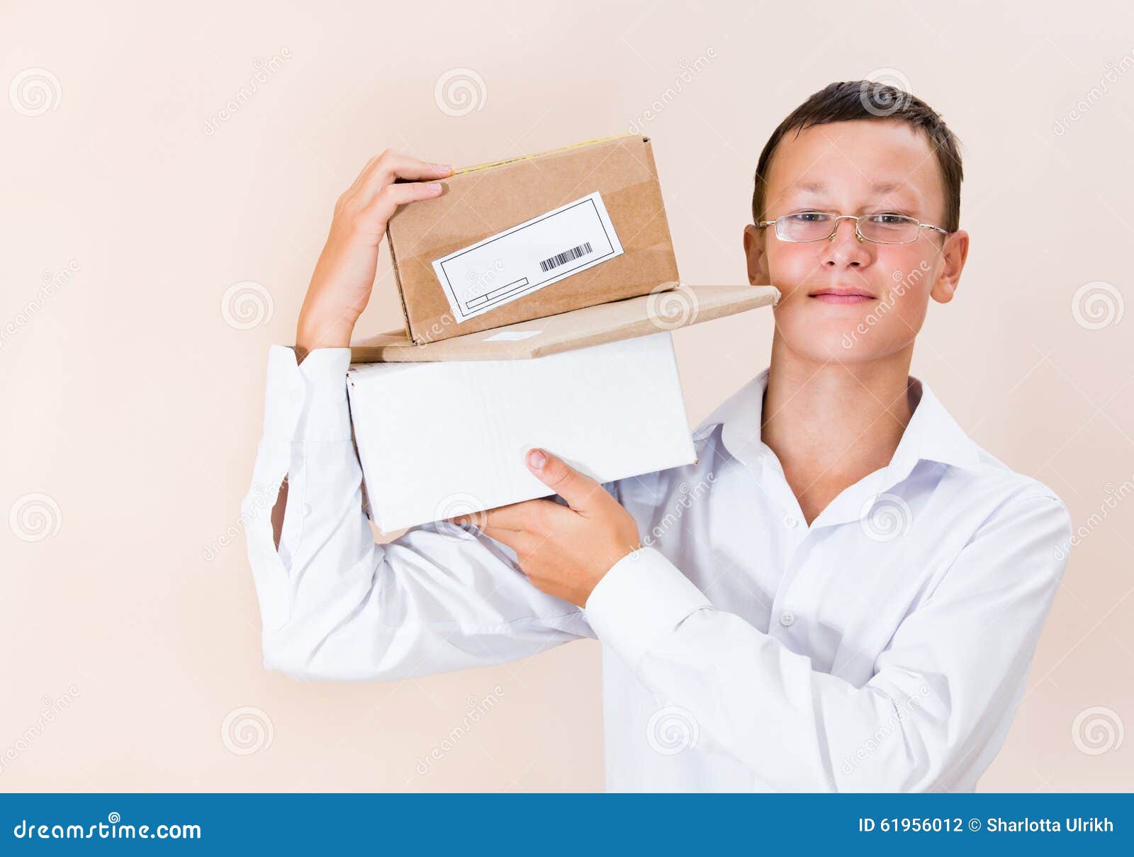 Boy postman with a parcel stock photo. Image of shipping - 61956012