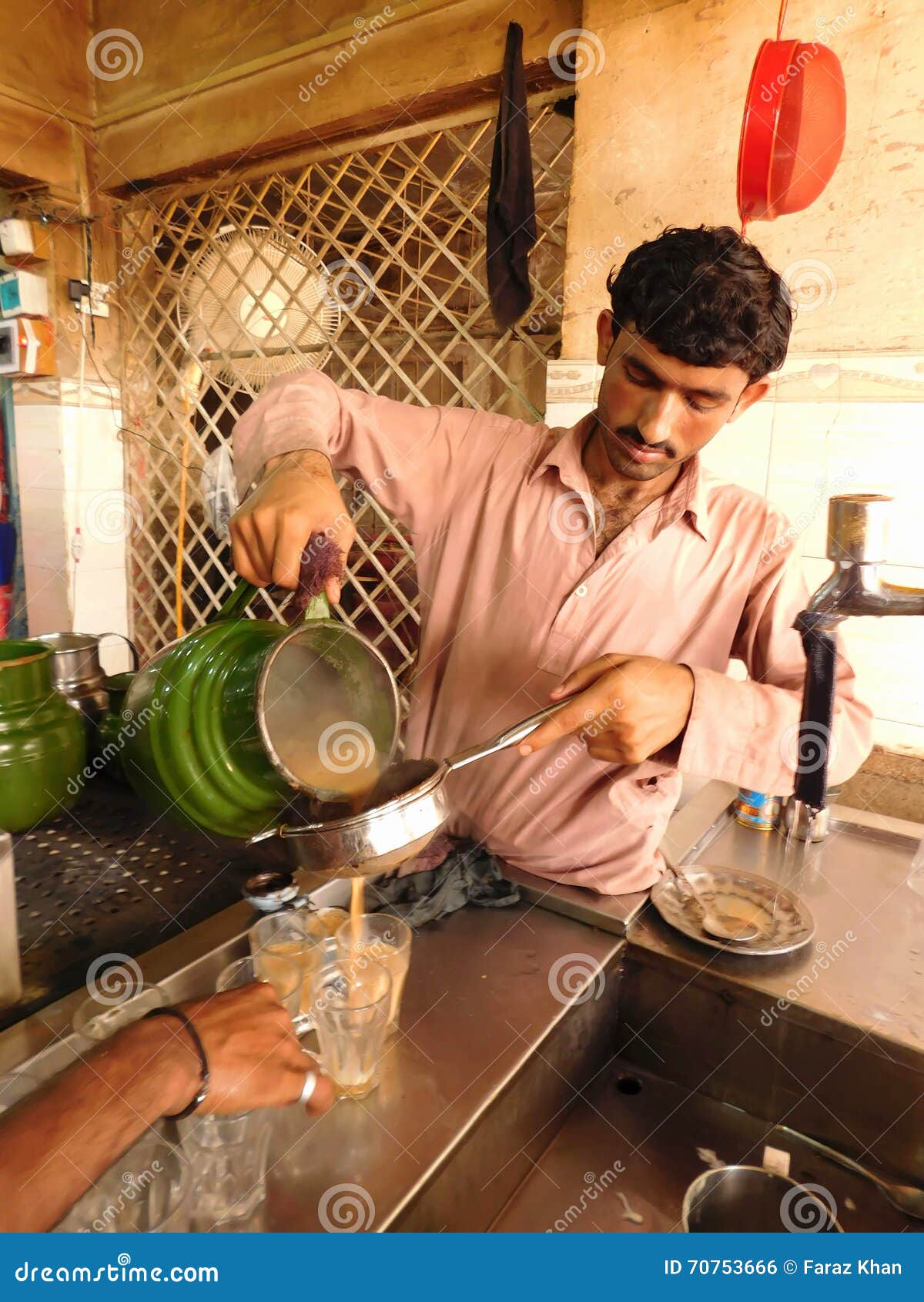 This Boy is pouring tea editorial photo. Image of sunshine - 70753666