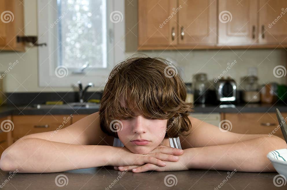 Boy pouting stock photo. Image of breakfast, alone, preteen - 13273666