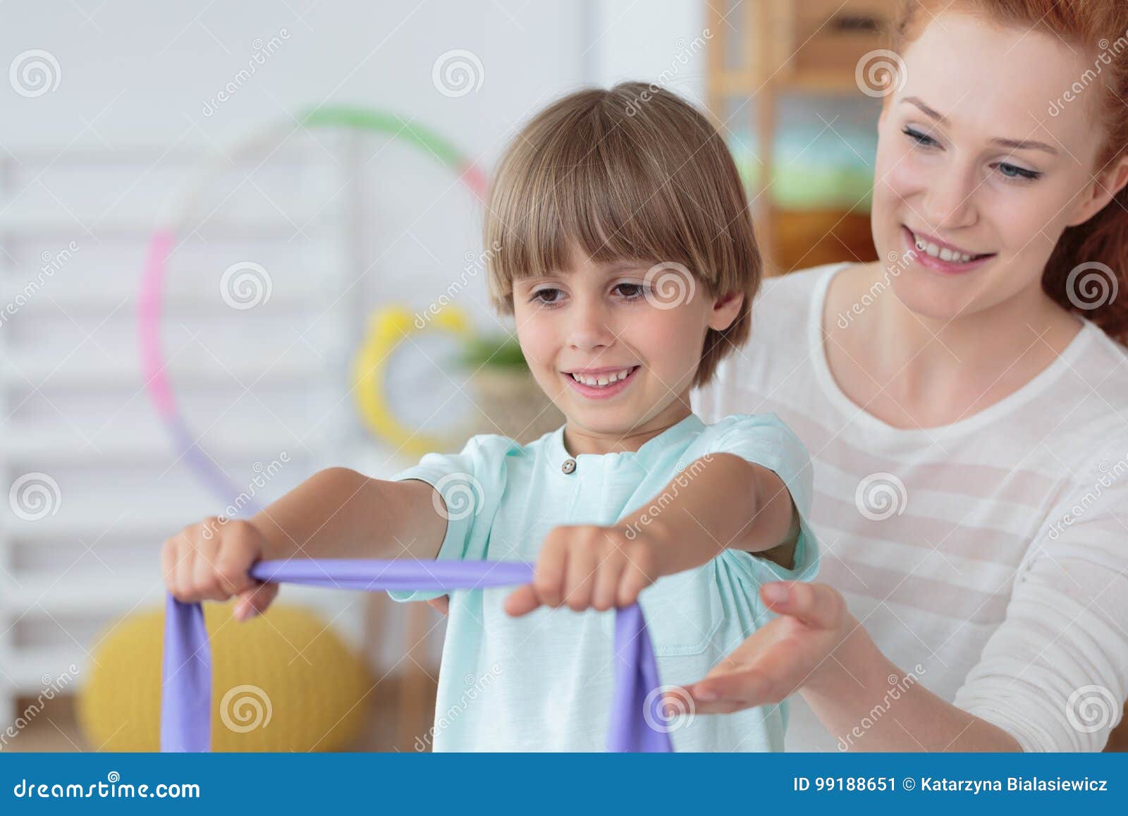 Boy Practicing with Elastic Band Stock Image - Image of posture, nurse ...