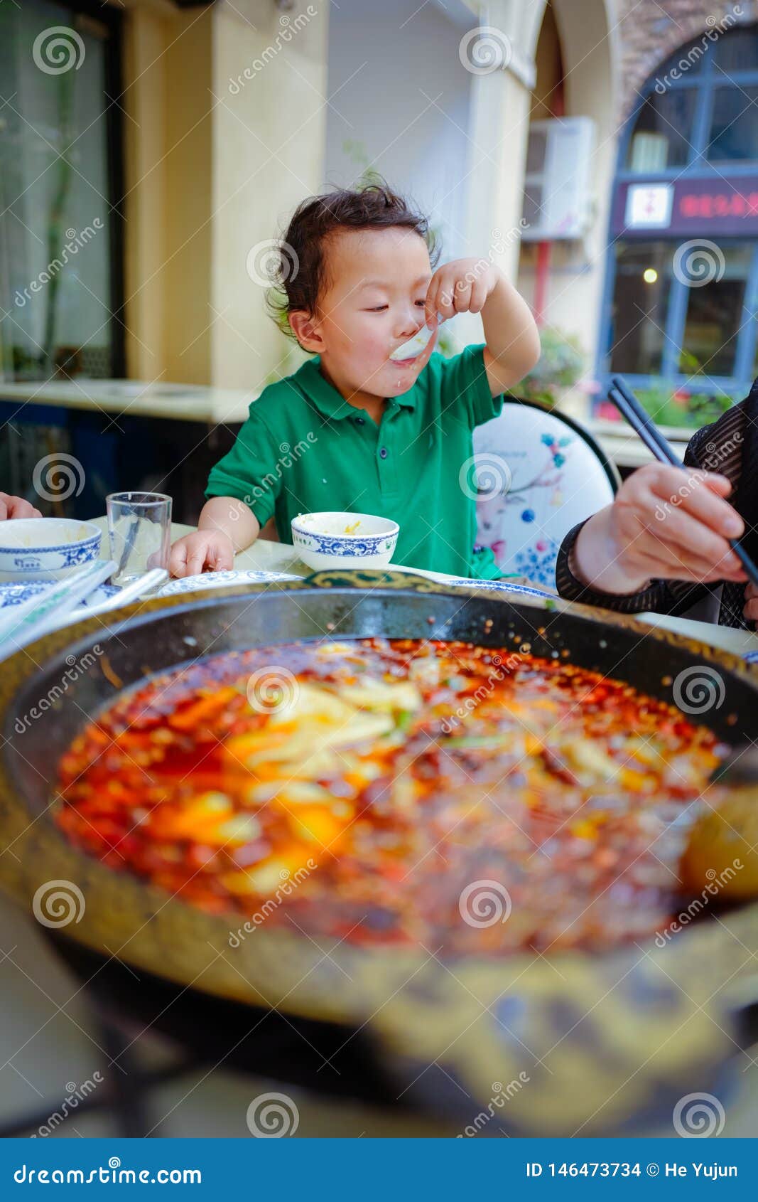 Boy prepare to eat hotpot stock photo. Image of summer - 146473734