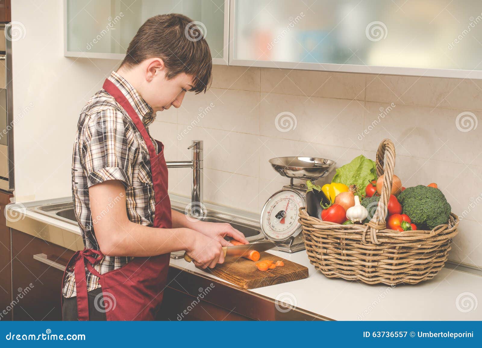 Boy Prepares Vegetables in the Kitchen Stock Image - Image of ...