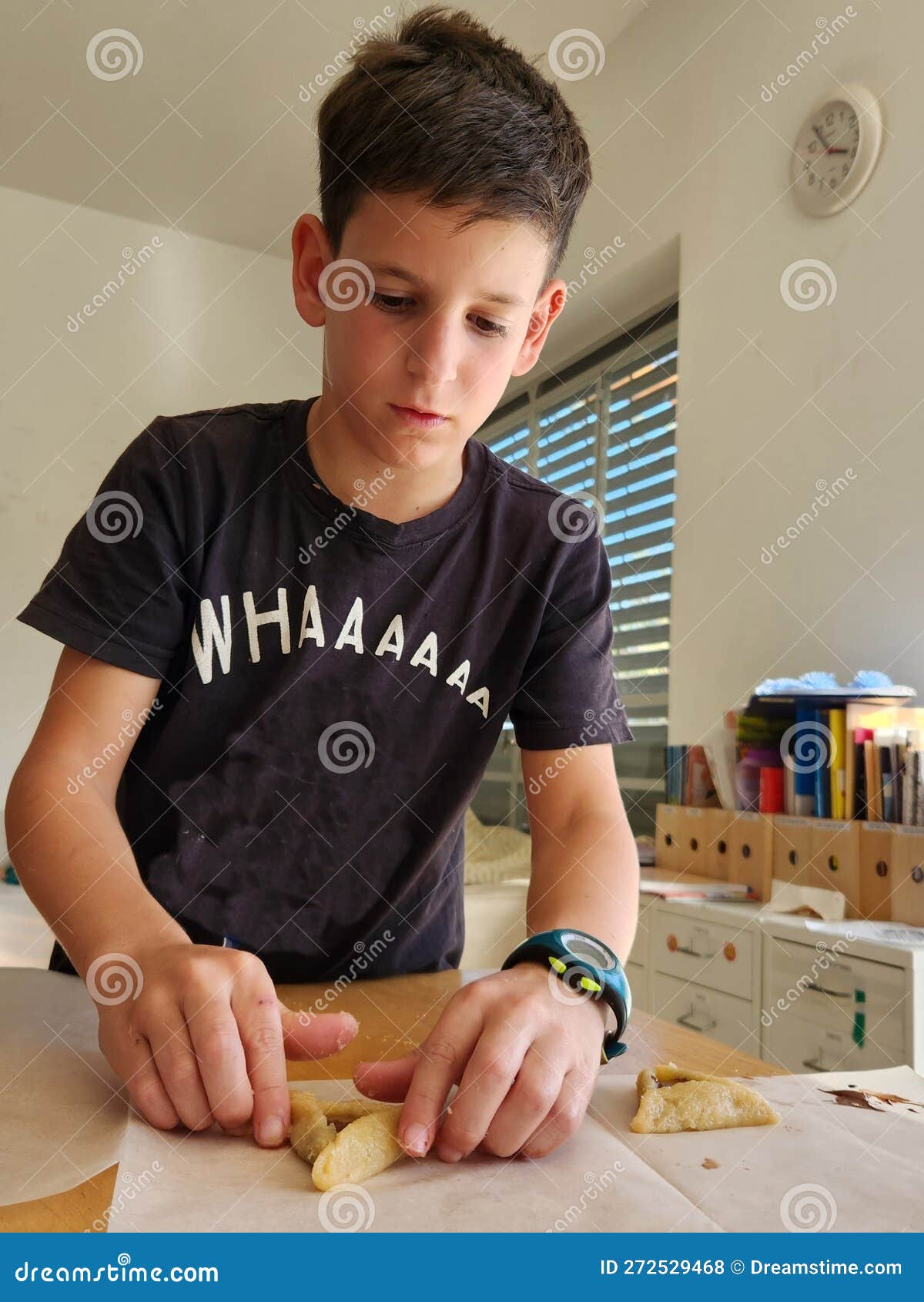Boy Preparing Cookies on the Table in the Kitchen Stock Photo - Image ...