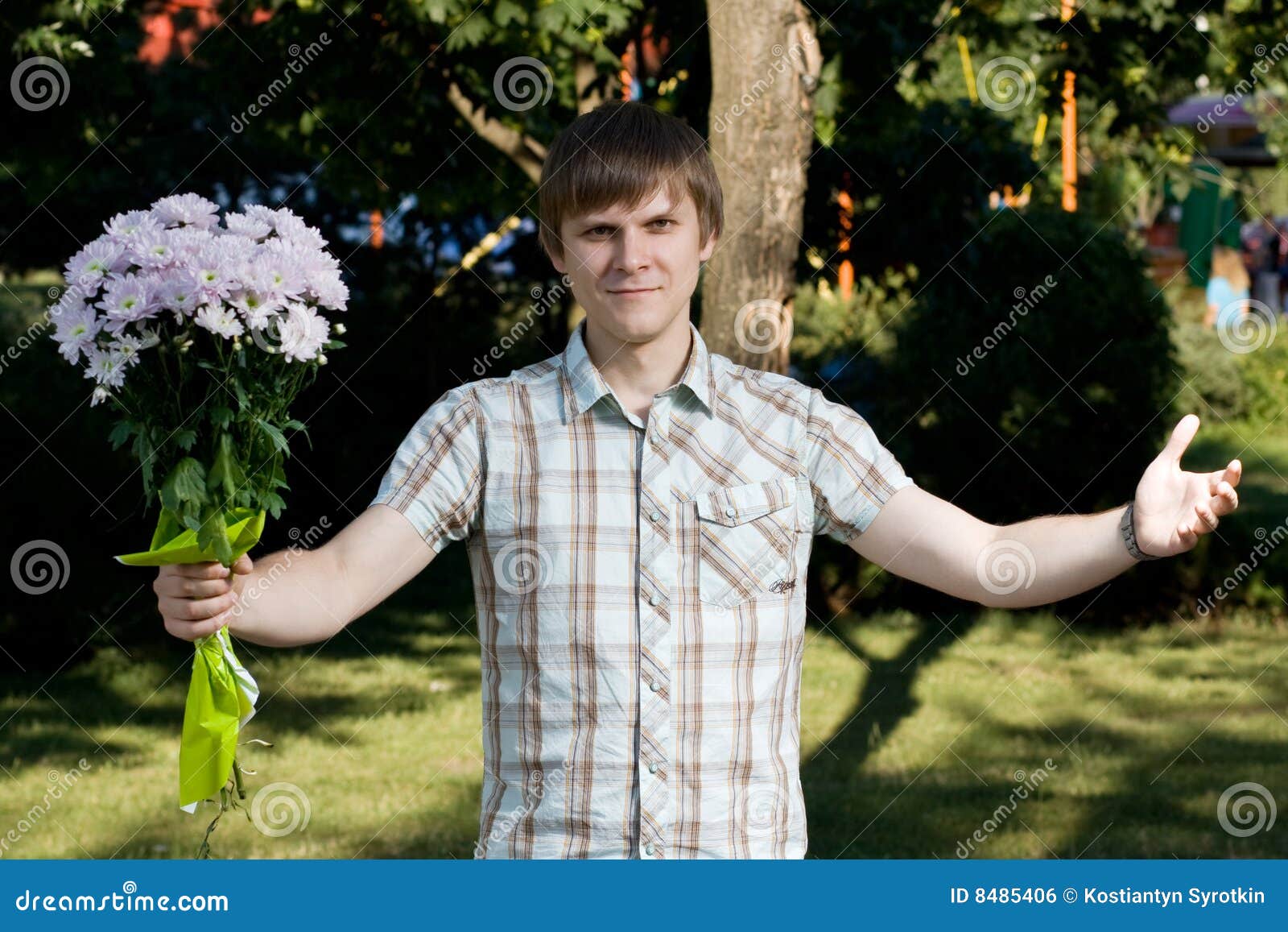 Boy Presenting Flowers Picture. Image: 8485406