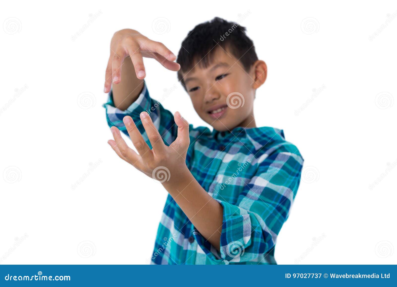 Boy Pretending To Hold Invisible Object Stock Image - Image of smiling ...