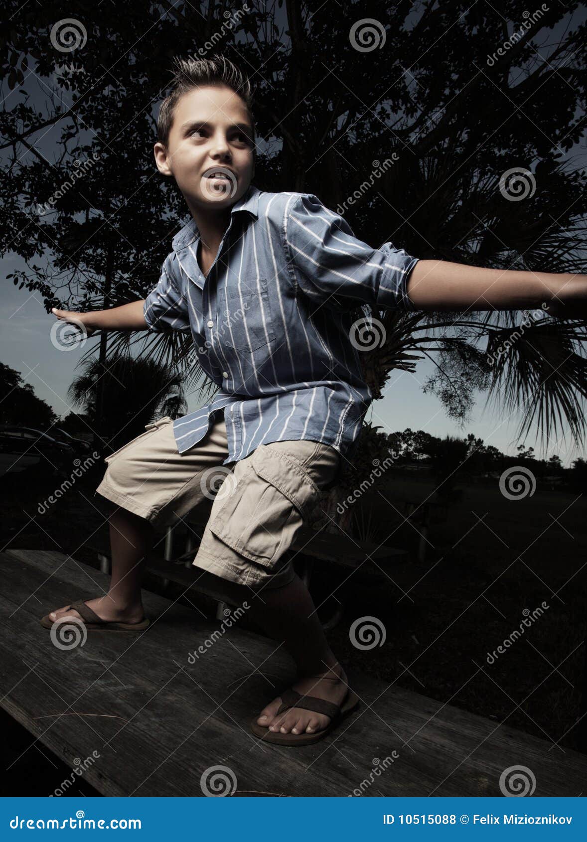 Boy pretending to surf stock photo. Image of pretend - 10515088