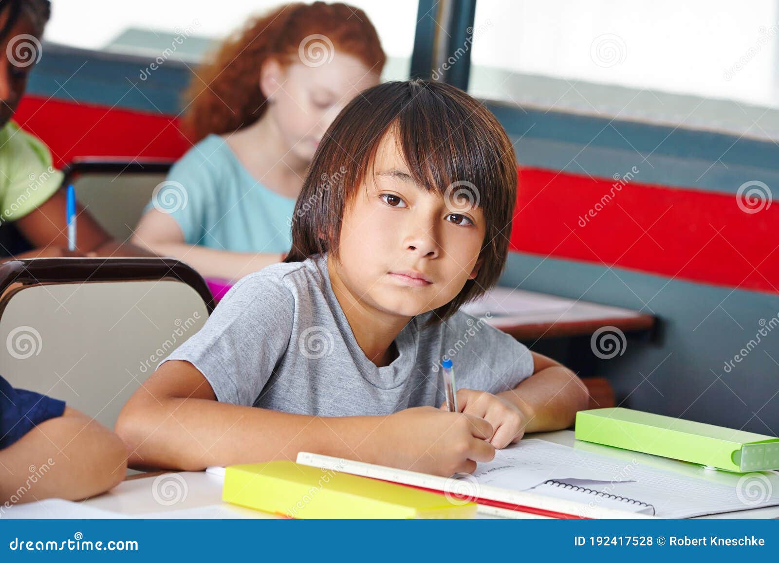 Boy in a Primary School Classroom Stock Photo - Image of write, learn ...