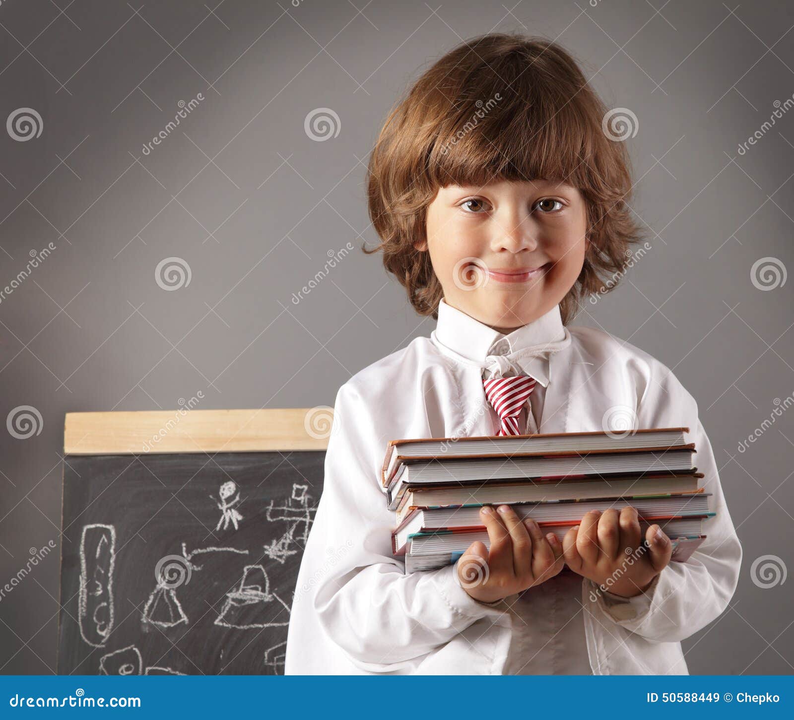 Boy Primary School Students with Books Stock Image - Image of ...