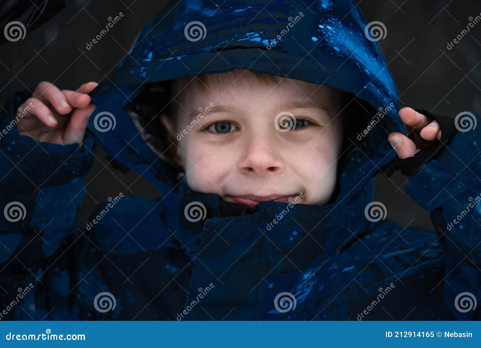 The Boy Pulled the Hoodie in His Jacket Over His Head Stock Image ...