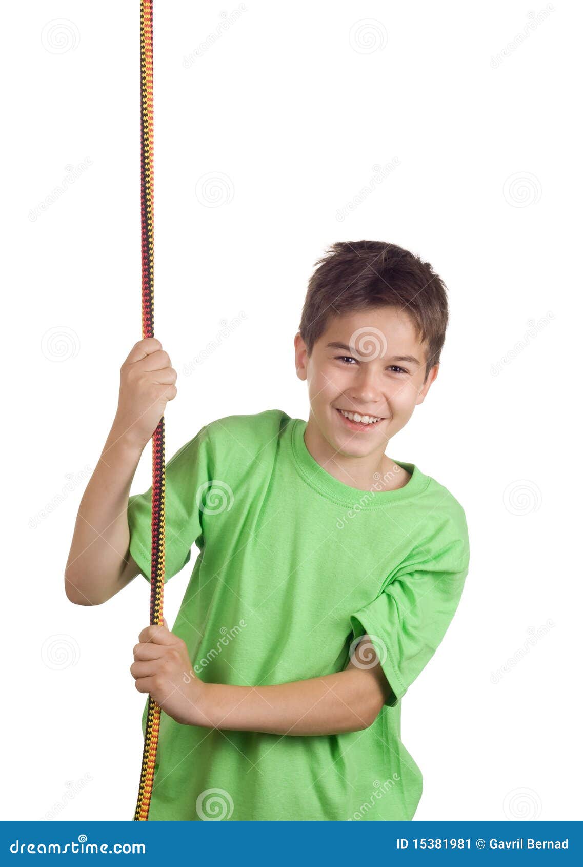 Boy pulling a rope stock image. Image of isolated, smiling - 15381981