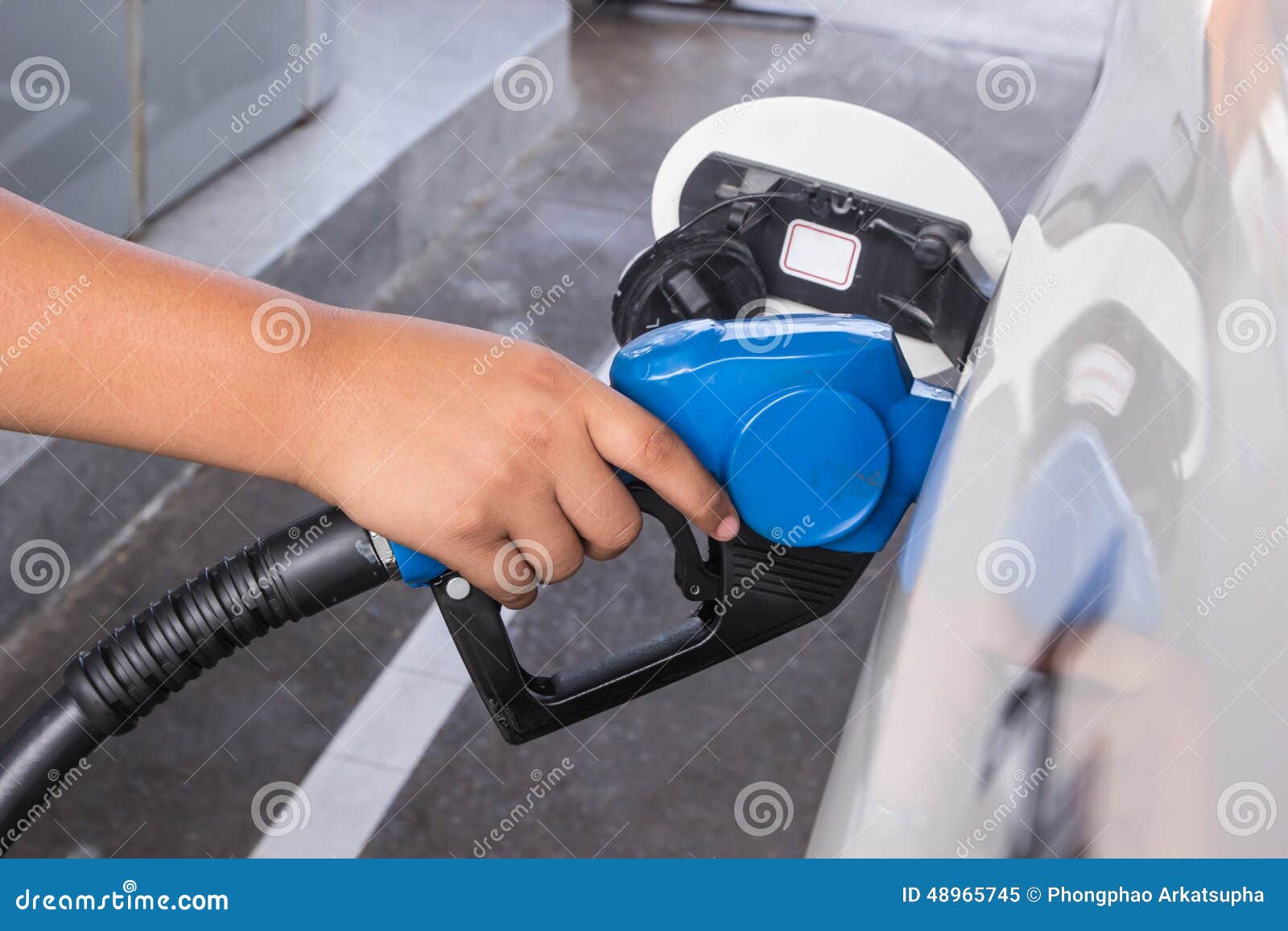 A boy pumping gas stock image. Image of hose, fuel, industry - 48965745